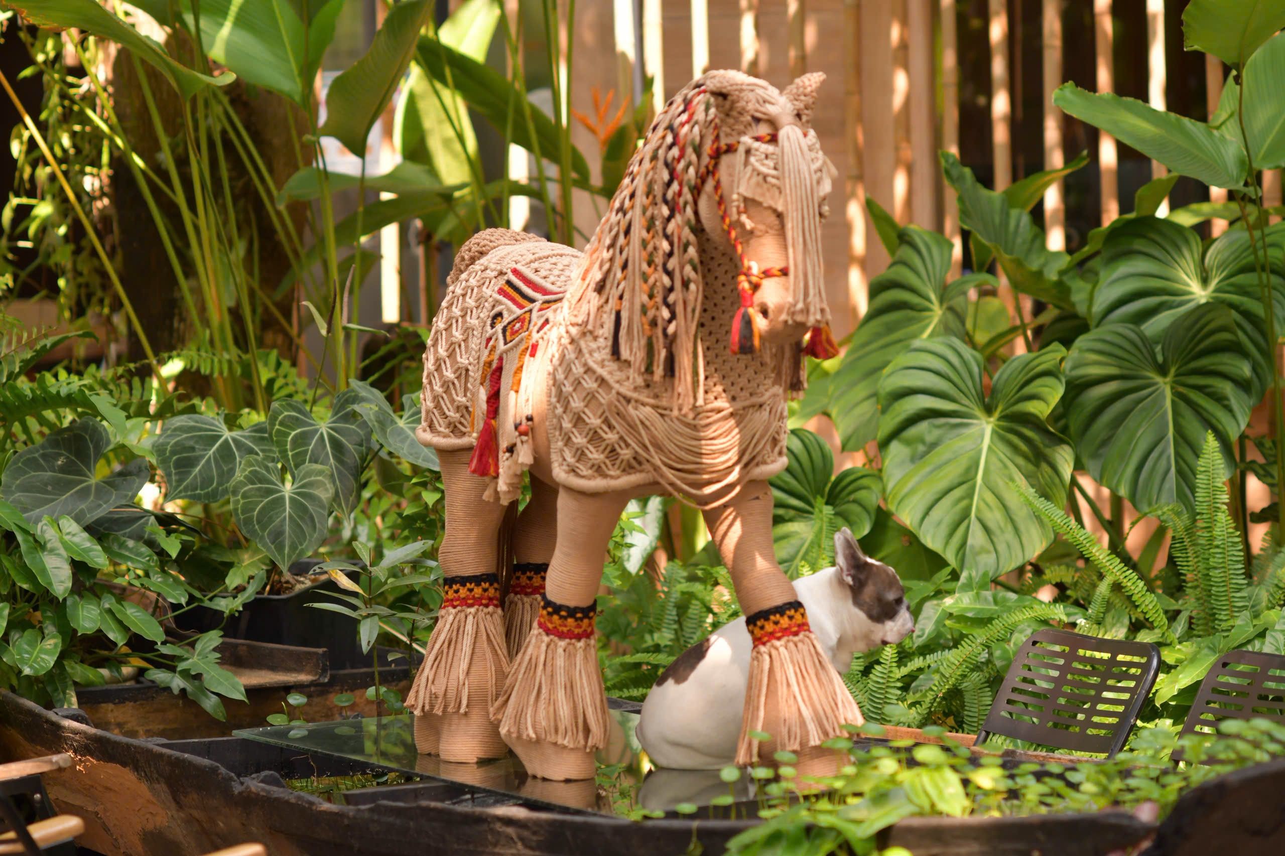 Decorative Straw Horse Statue in Tropical Garden · Free Stock Photo
