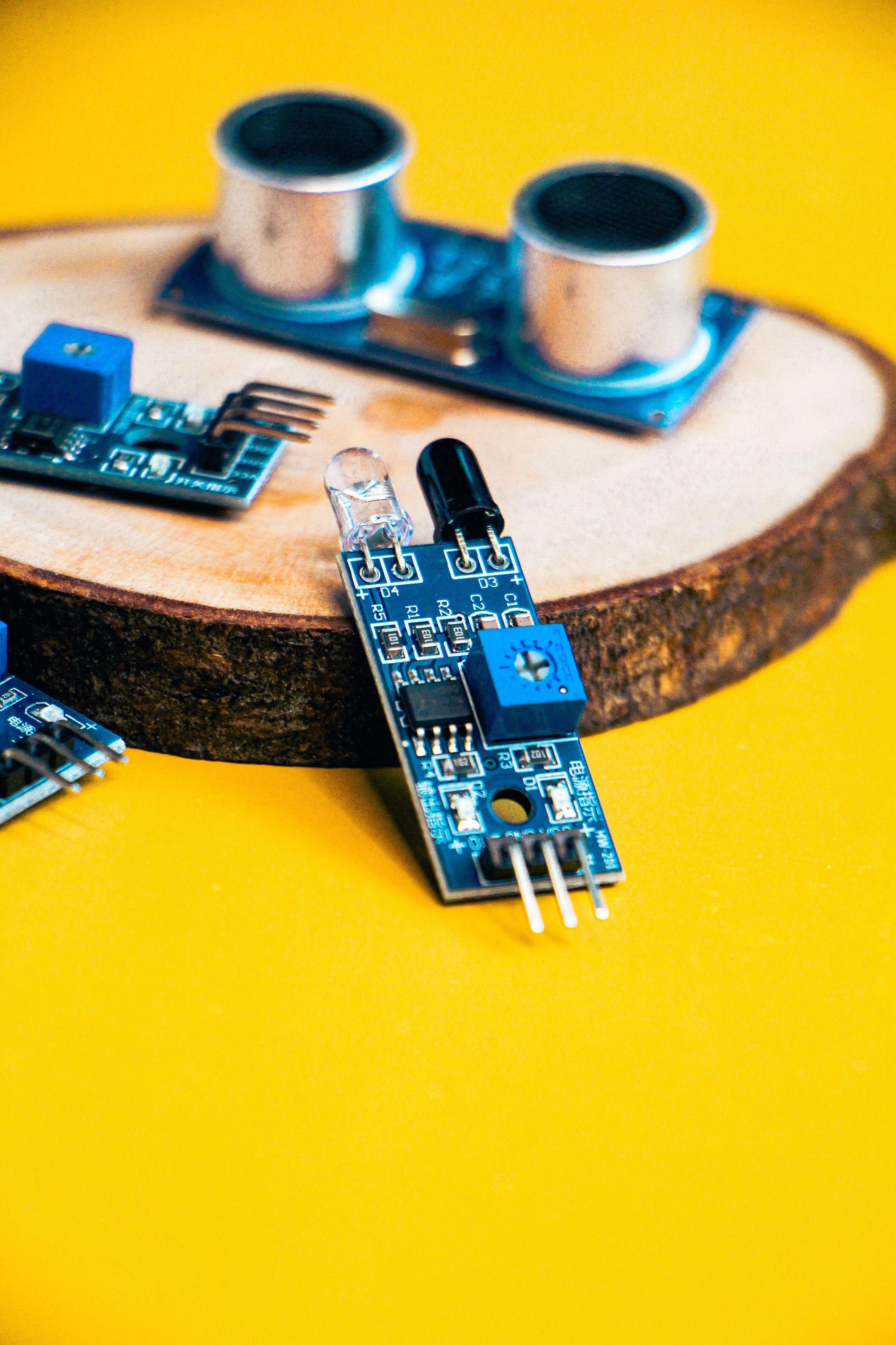 Close-up of Robotics Components on Wood · Free Stock Photo