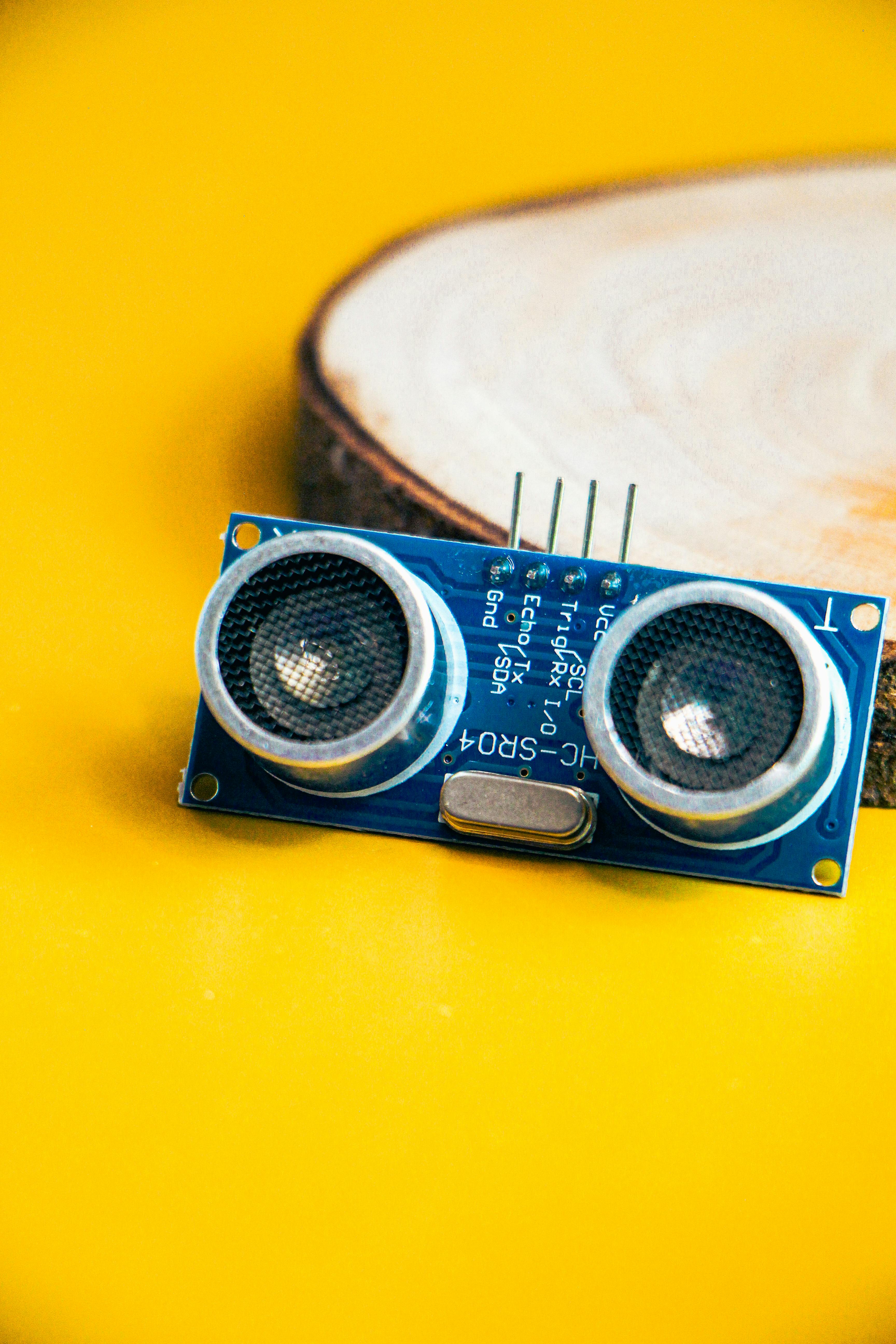 Ultrasonic Sensor Module on Yellow Background · Free Stock Photo