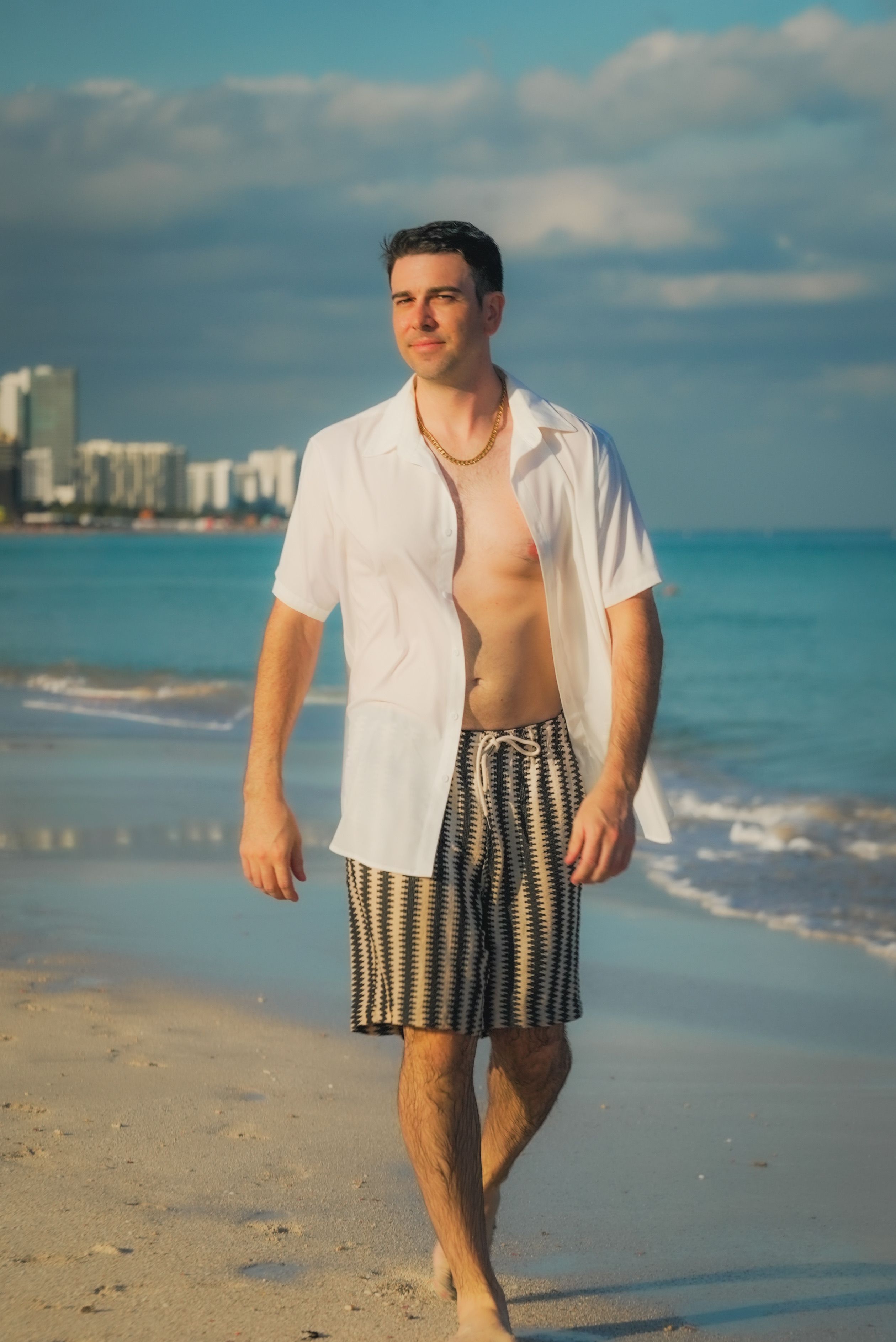 Man Walking on Miami Beach in Summer · Free Stock Photo