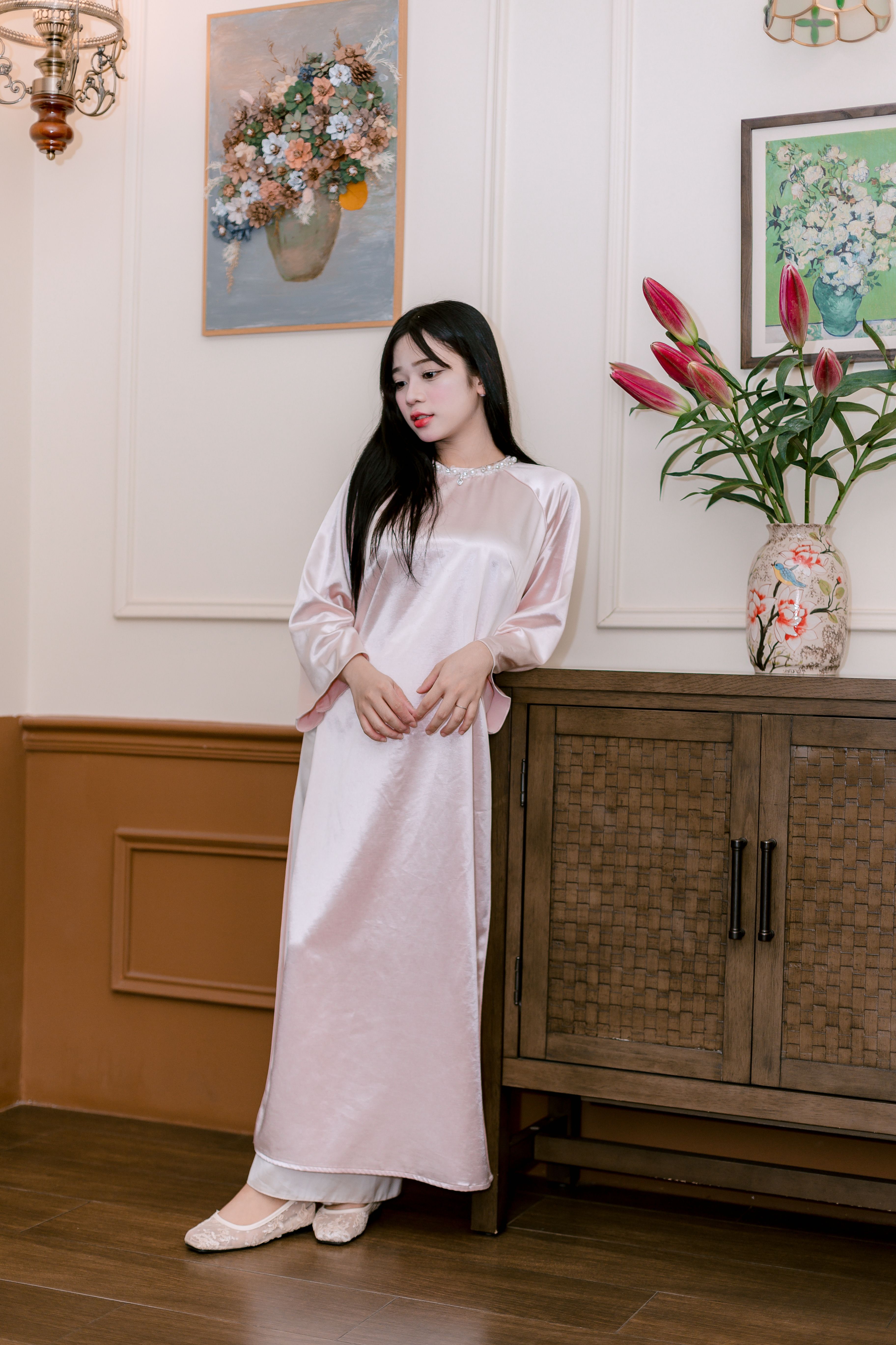 Elegant Woman in Silk Robe with Floral Background · Free Stock Photo