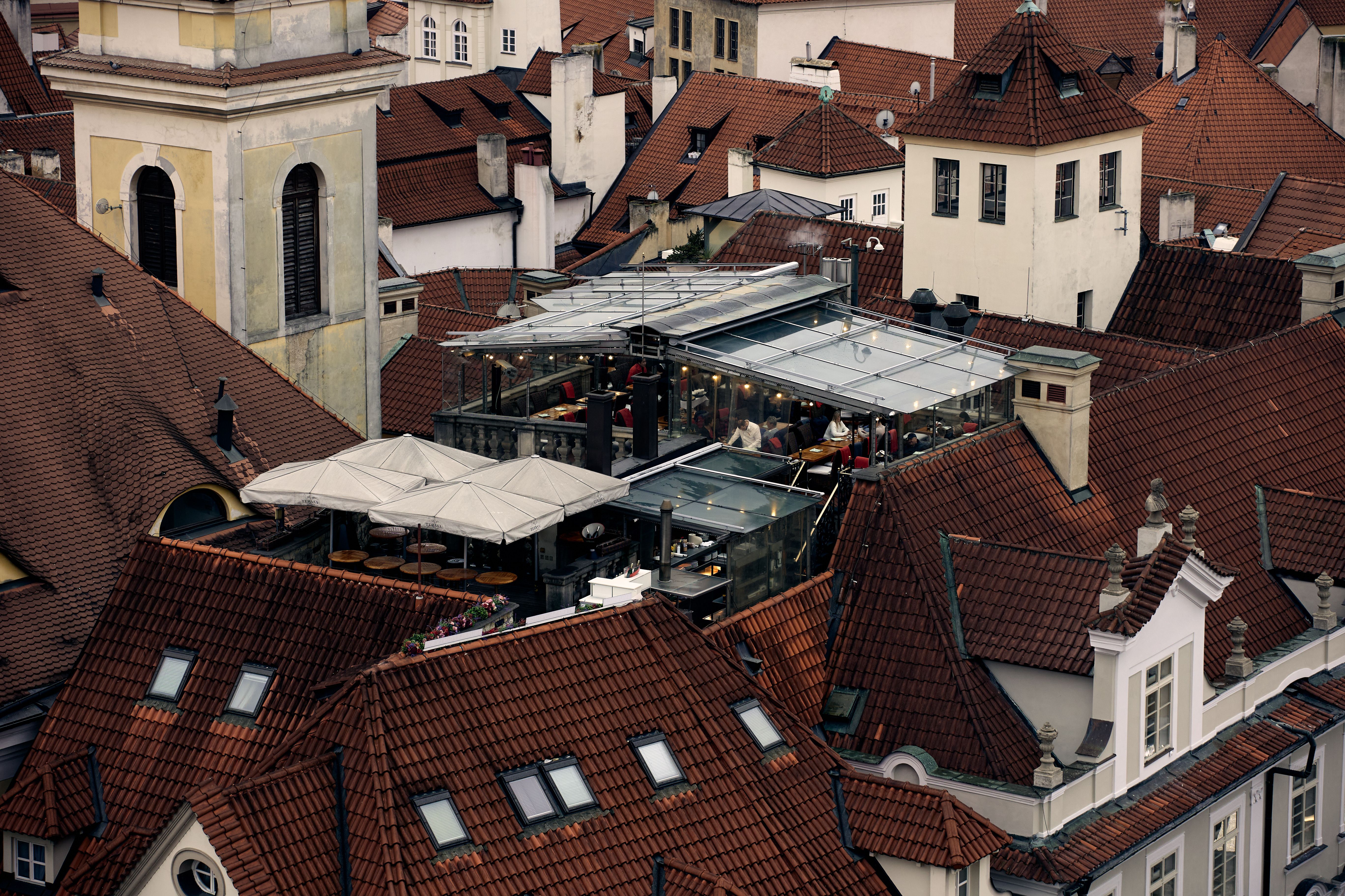 Aerial View of Rooftop Restaurant in European City · Free Stock Photo
