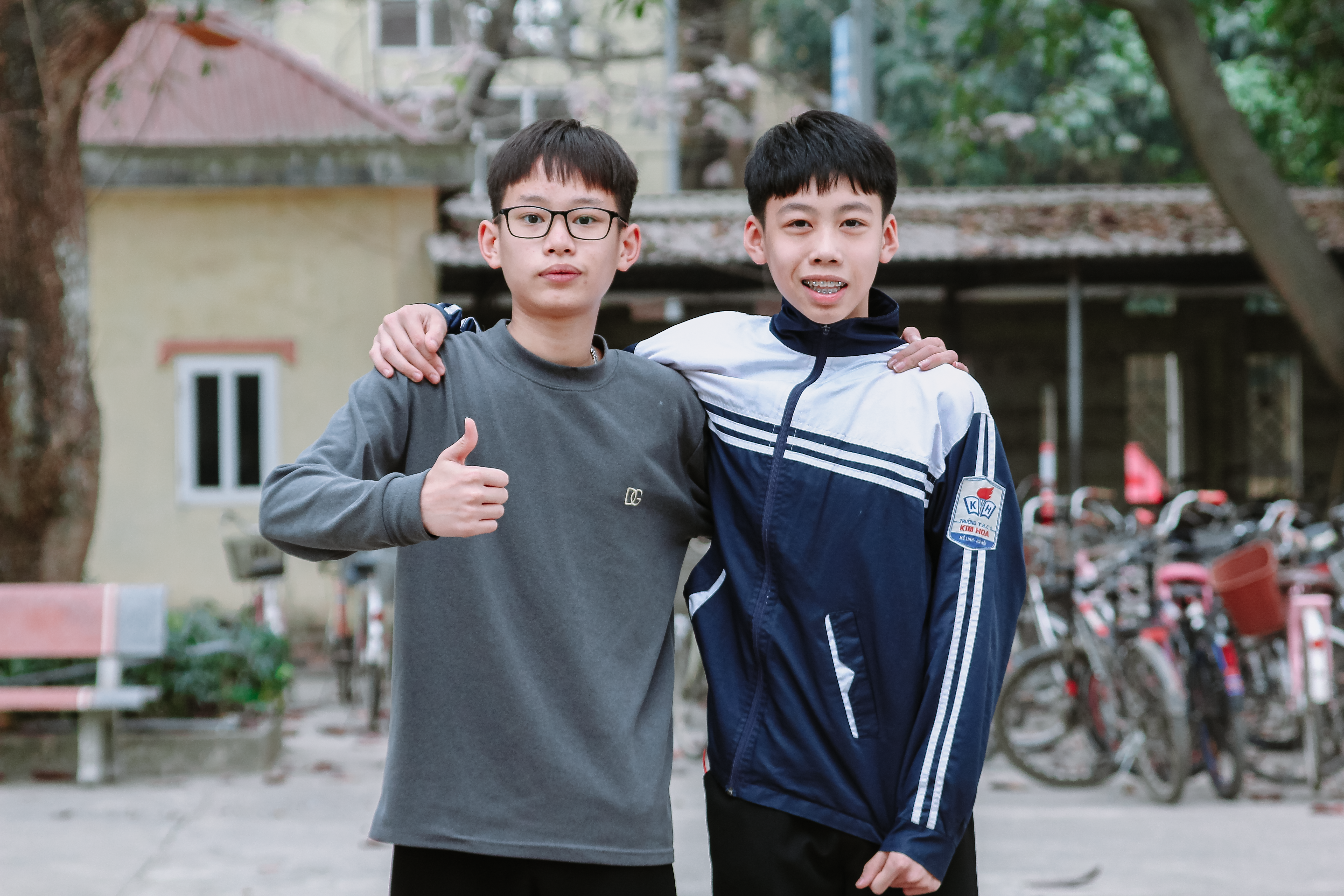 Two Friends Posing Together Outdoors · Free Stock Photo