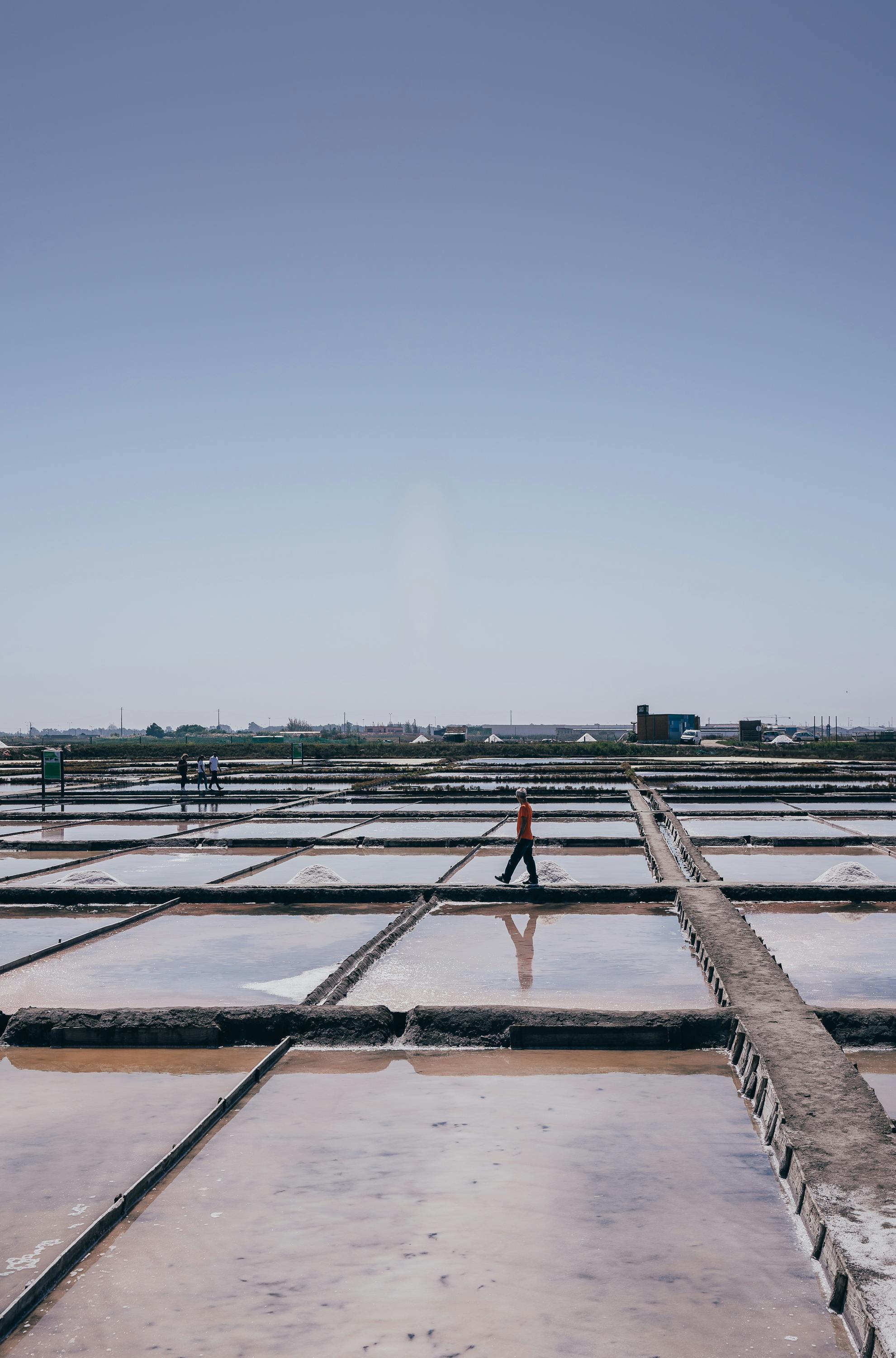 Person Walking on Salt Field · Free Stock Photo