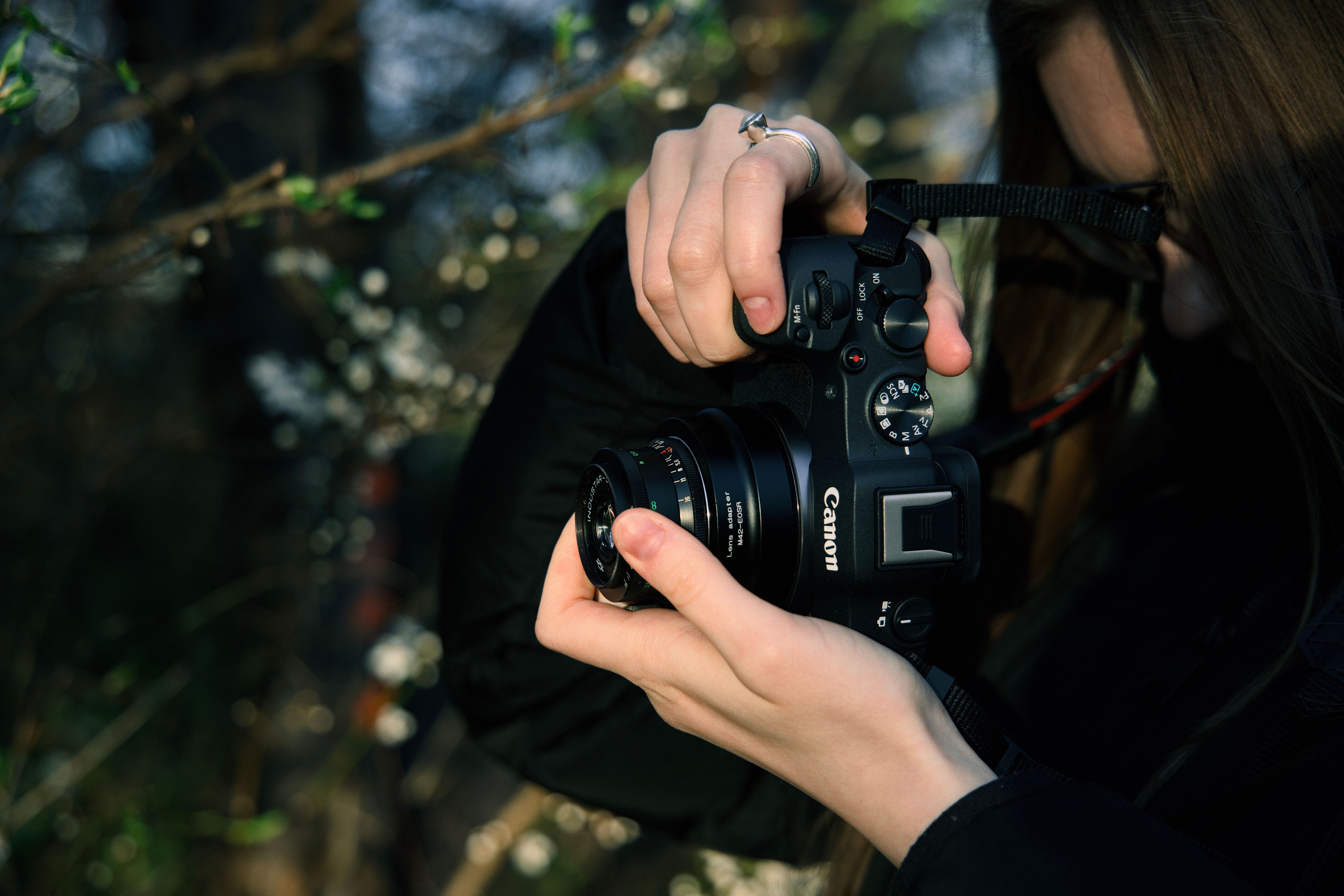 Amateur Photographer Shooting Outdoors with Canon · Free Stock Photo