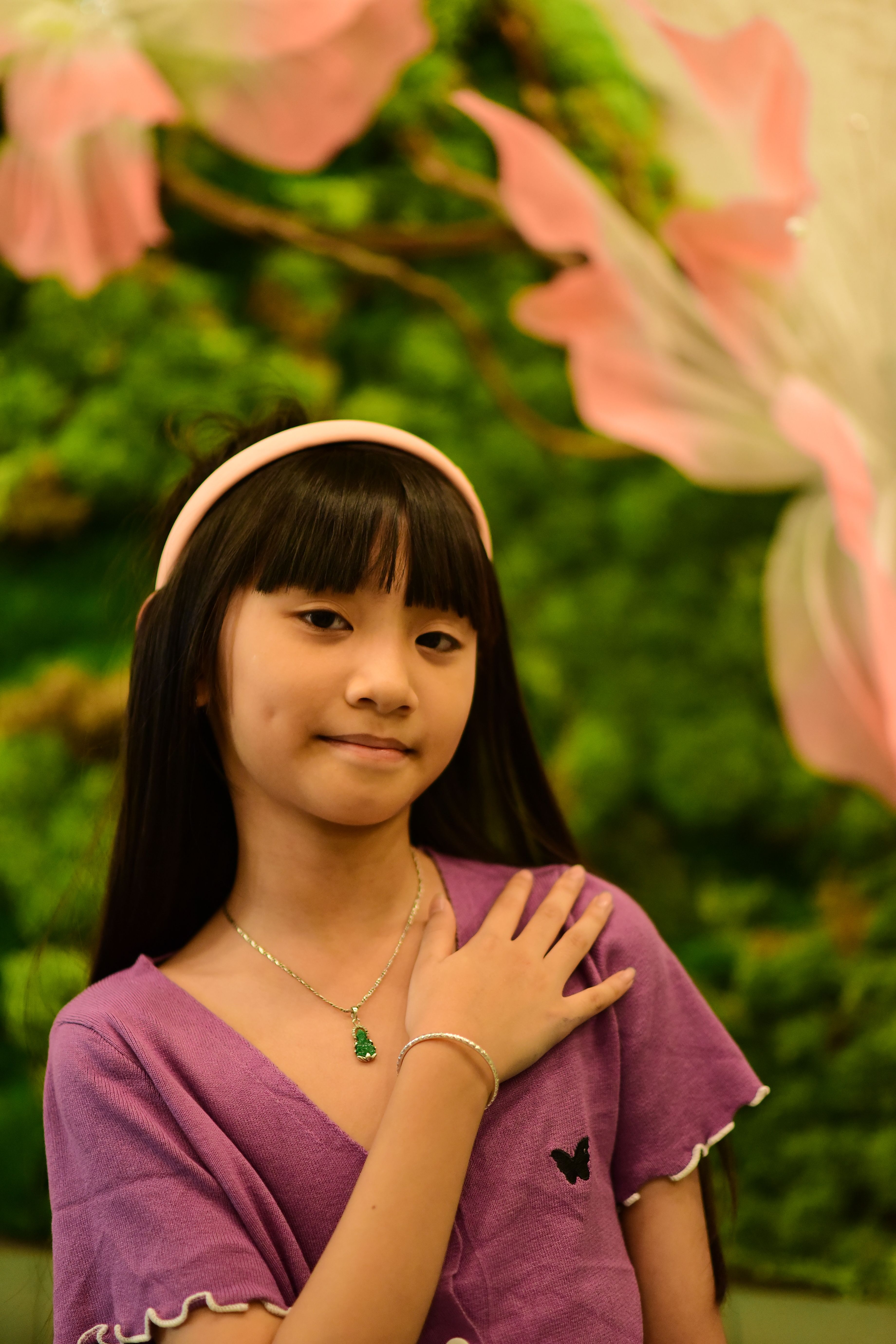 Portrait of a Young Girl in Vibrant Setting · Free Stock Photo