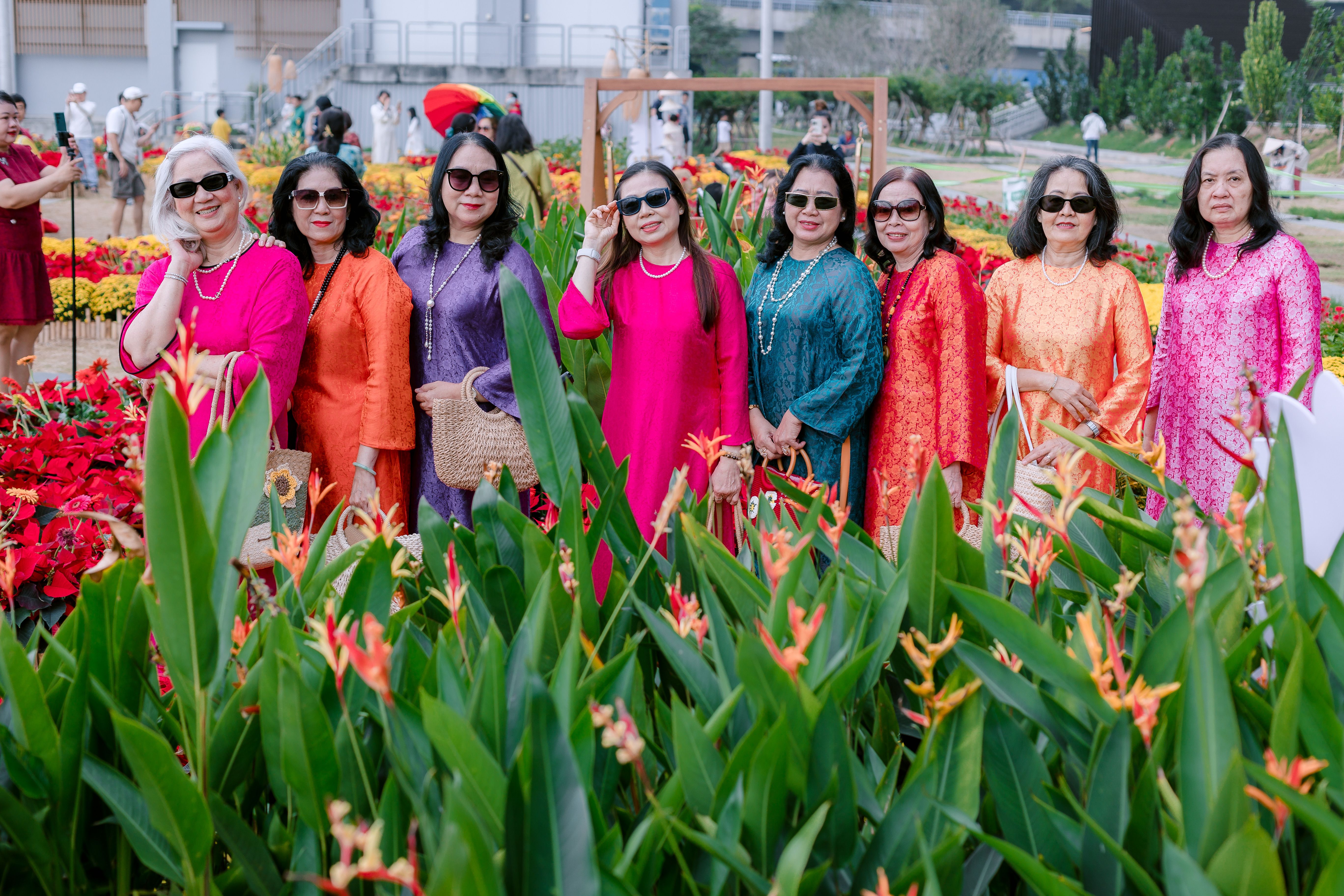 Group of Women in Ao Dai at Flower Garden · Free Stock Photo
