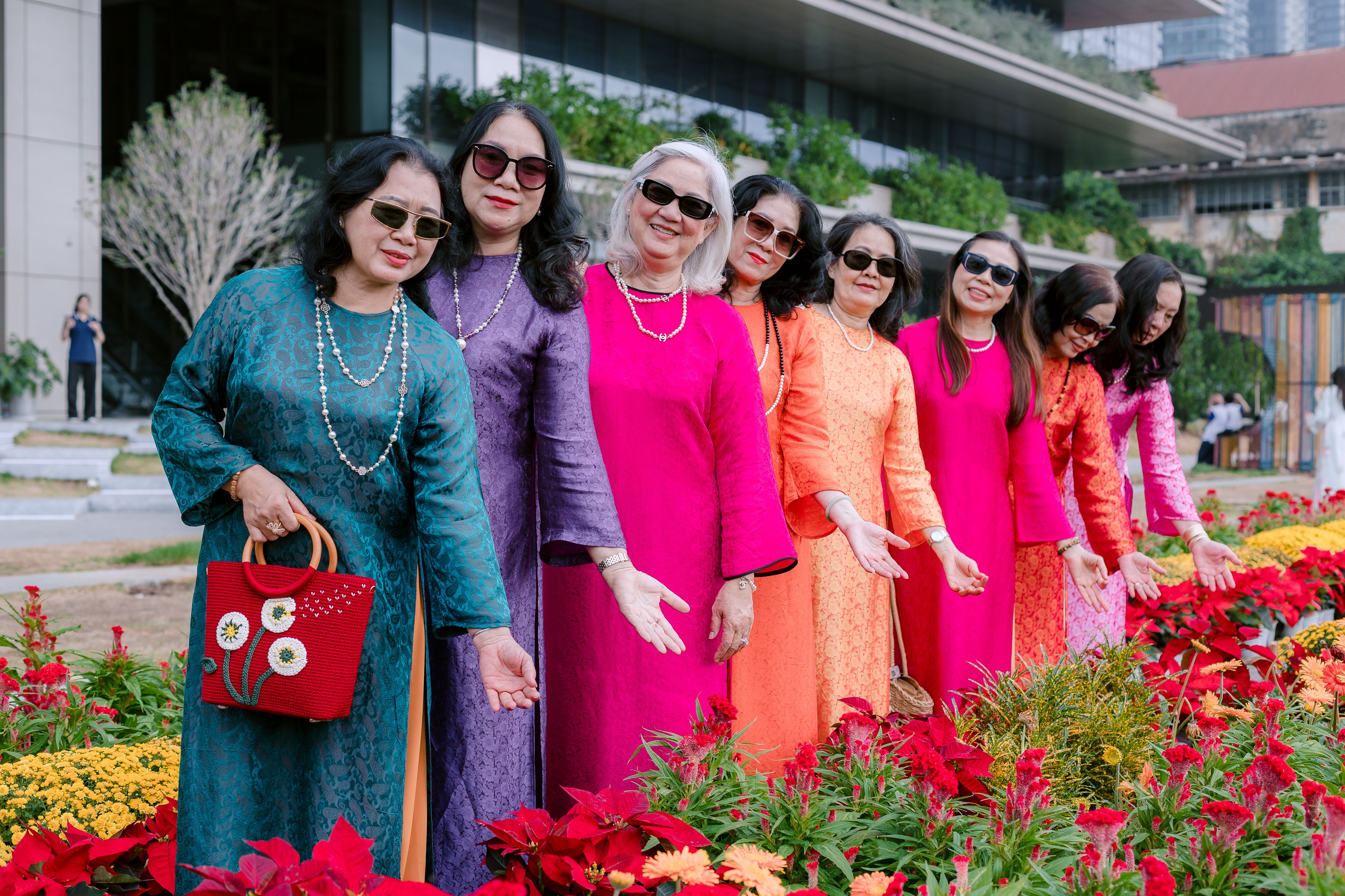 Group of Women in Traditional Dresses Smiling Outdoors · Free Stock Photo