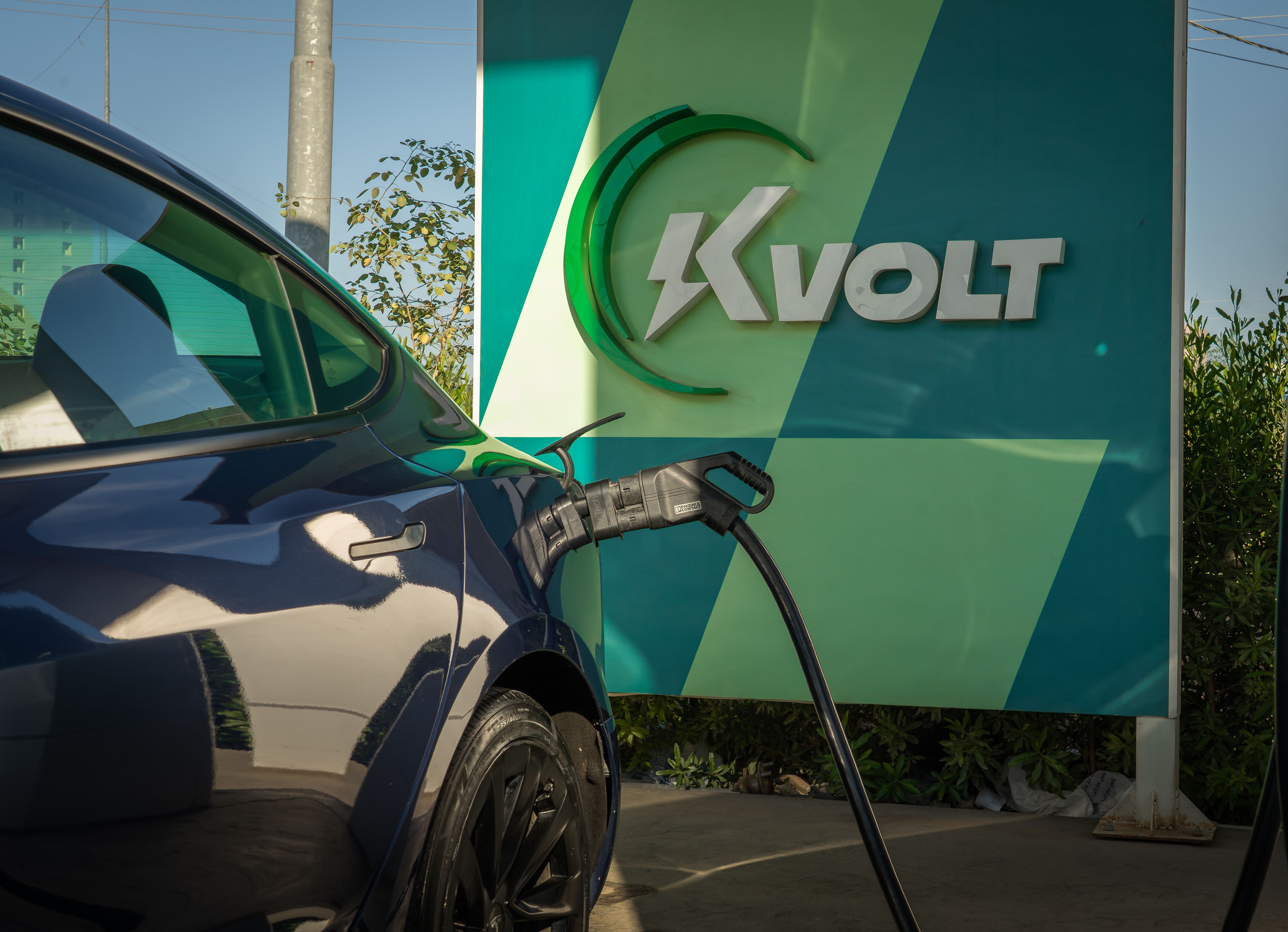 Charging Electric Car at Kvolt Station · Free Stock Photo