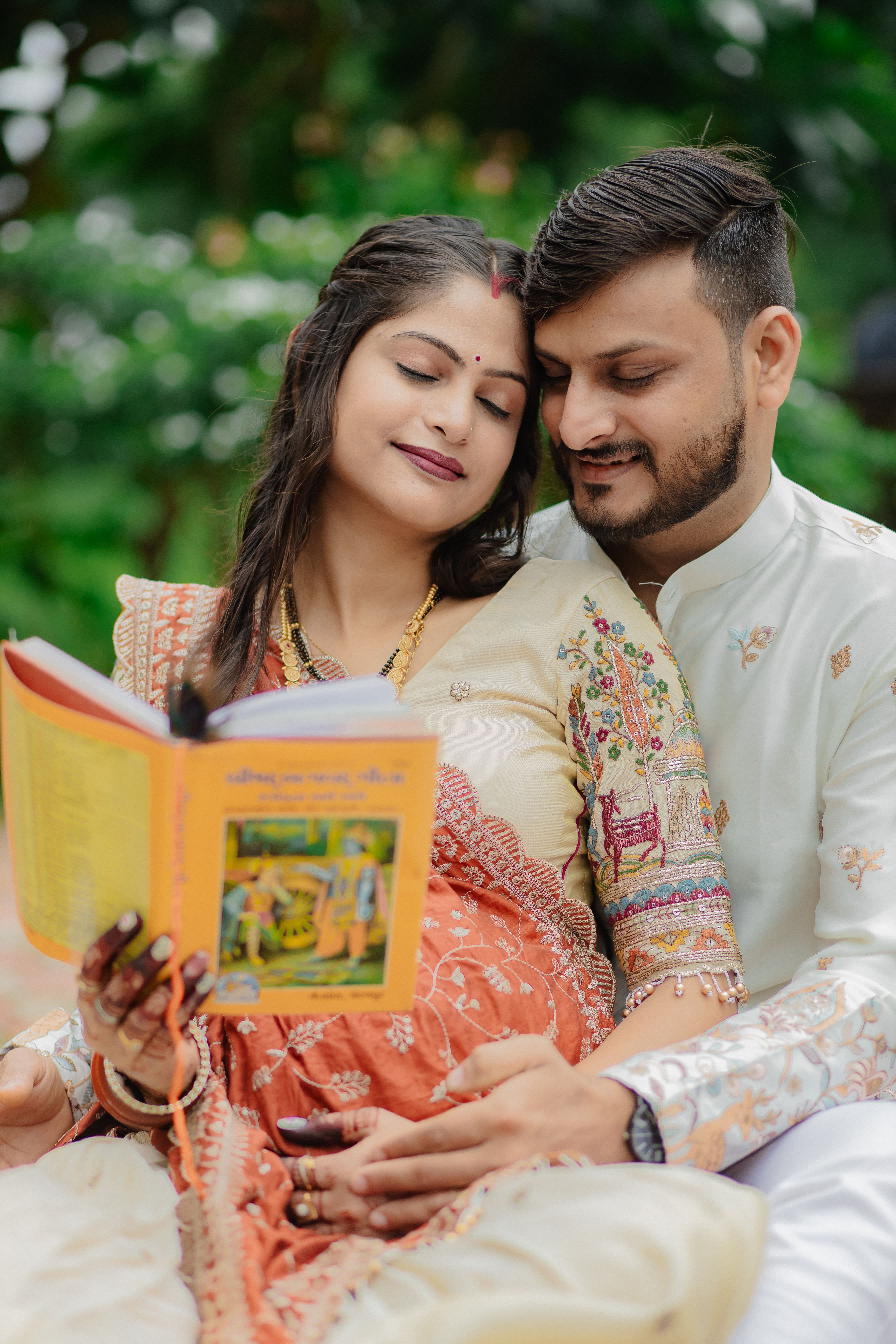 Romantic Couple Reading Together Outdoors · Free Stock Photo