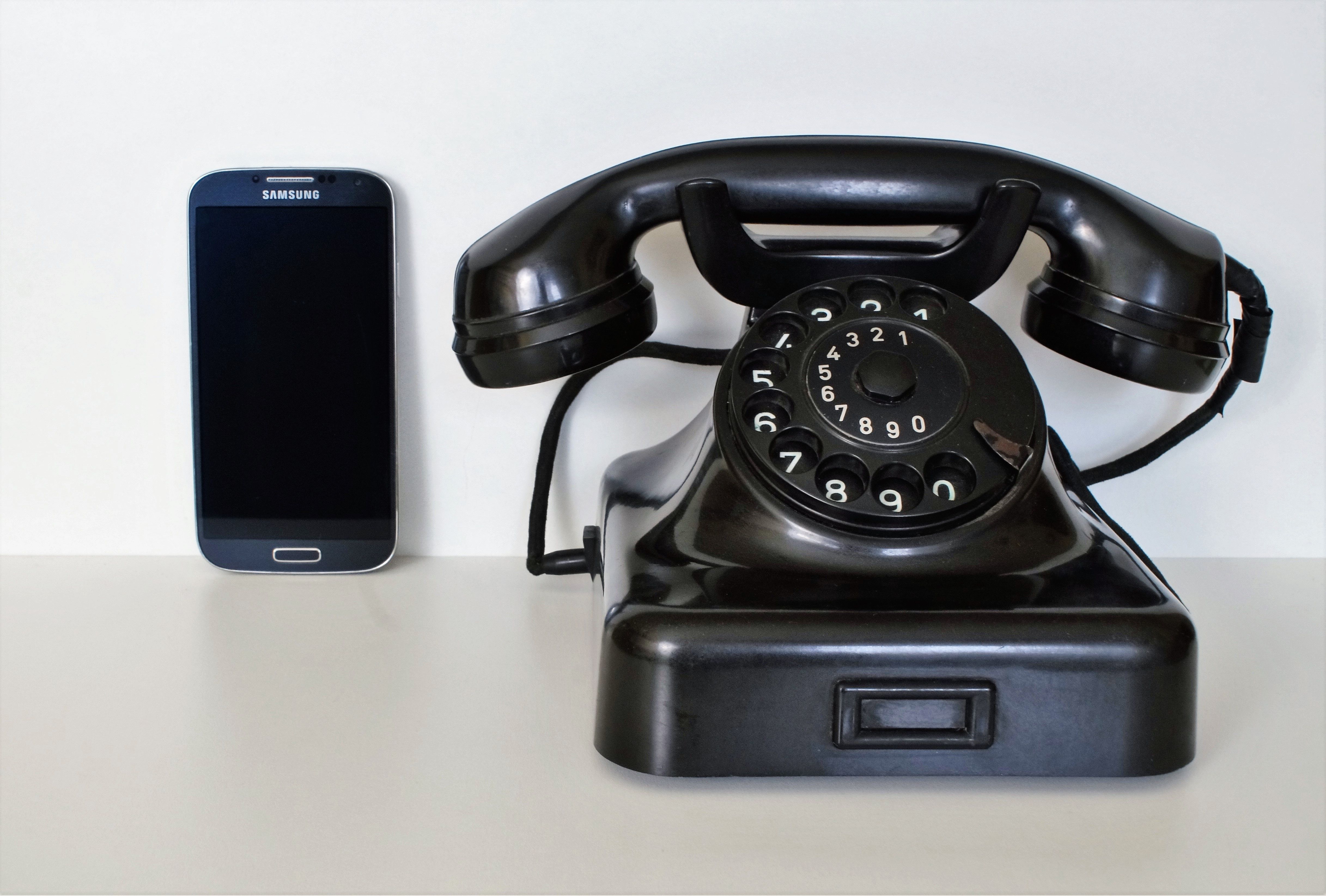 Selective Focus Photography of Black Rotary Phone · Free Stock Photo