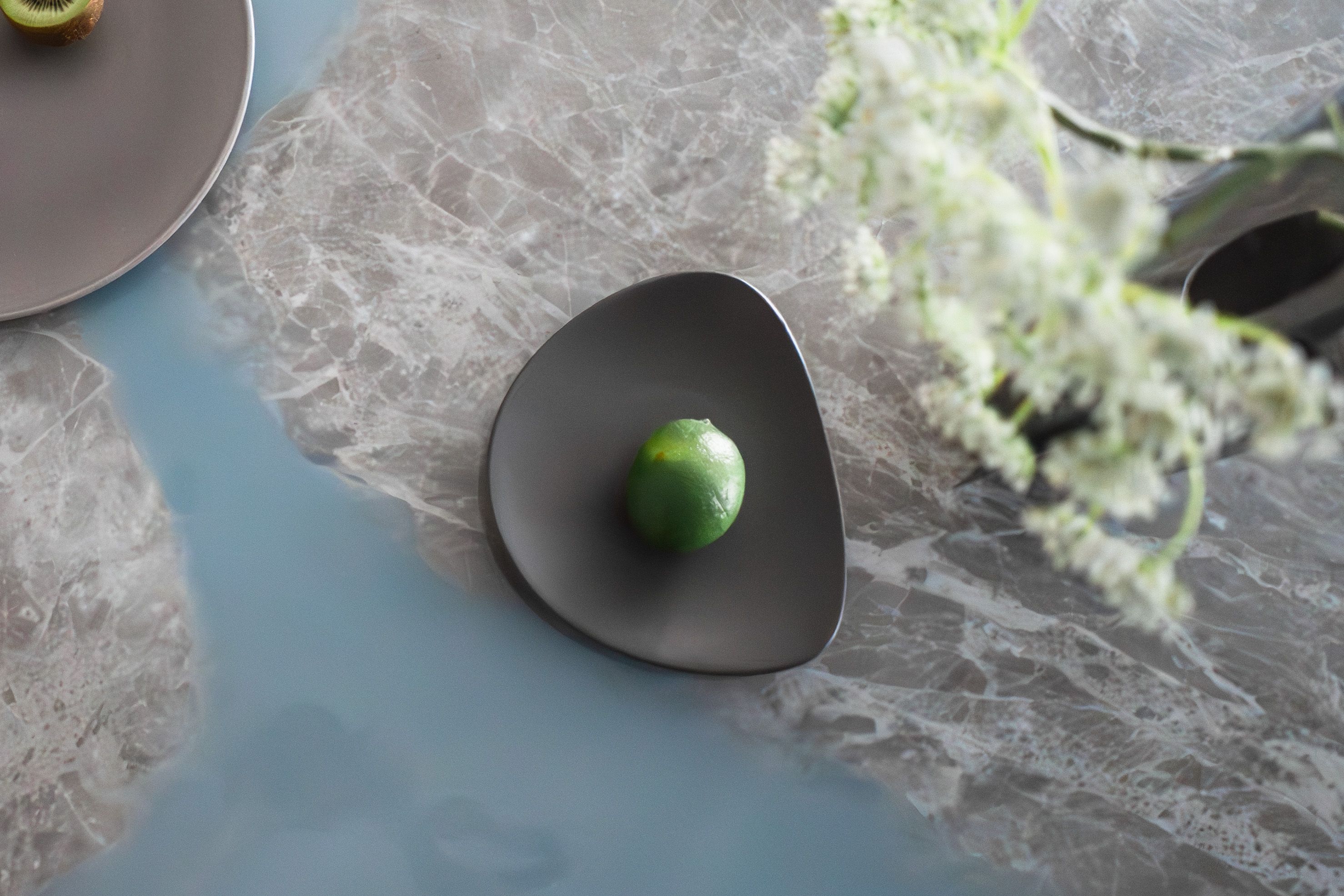 Modern Still Life with Lime and Marble Table · Free Stock Photo