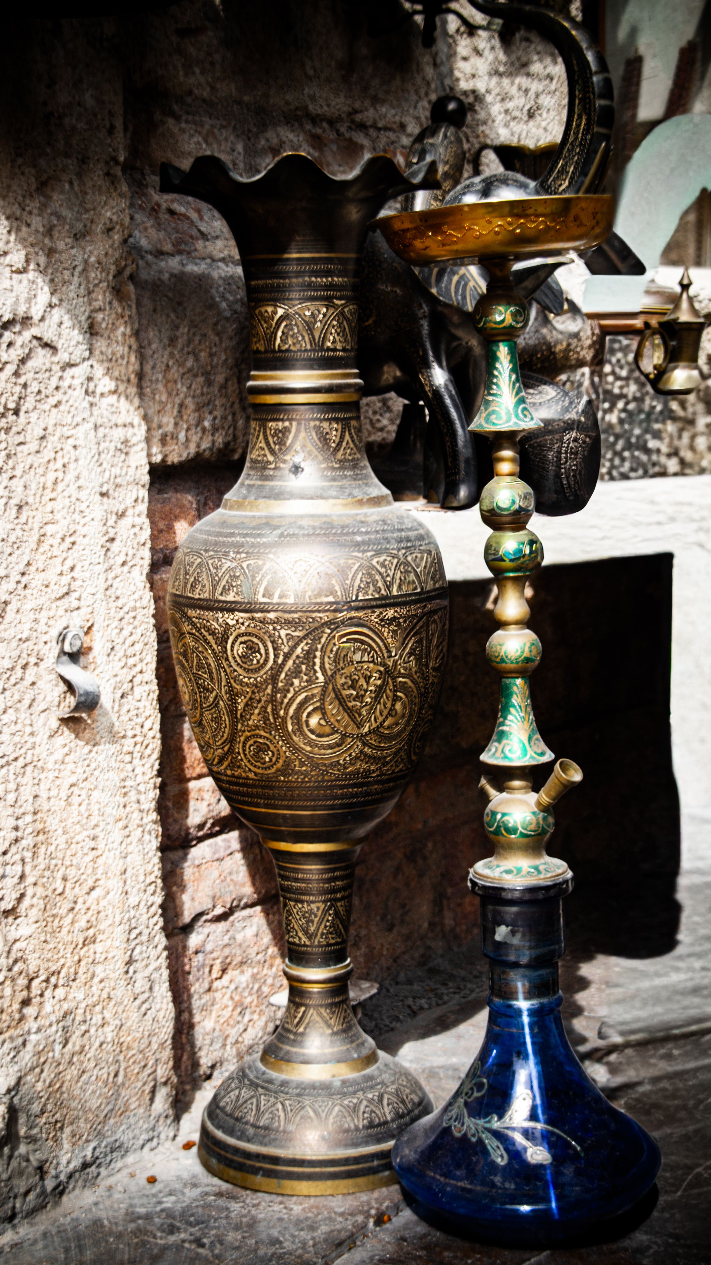 Ornate Middle Eastern Hookah and Vase Outdoors · Free Stock Photo
