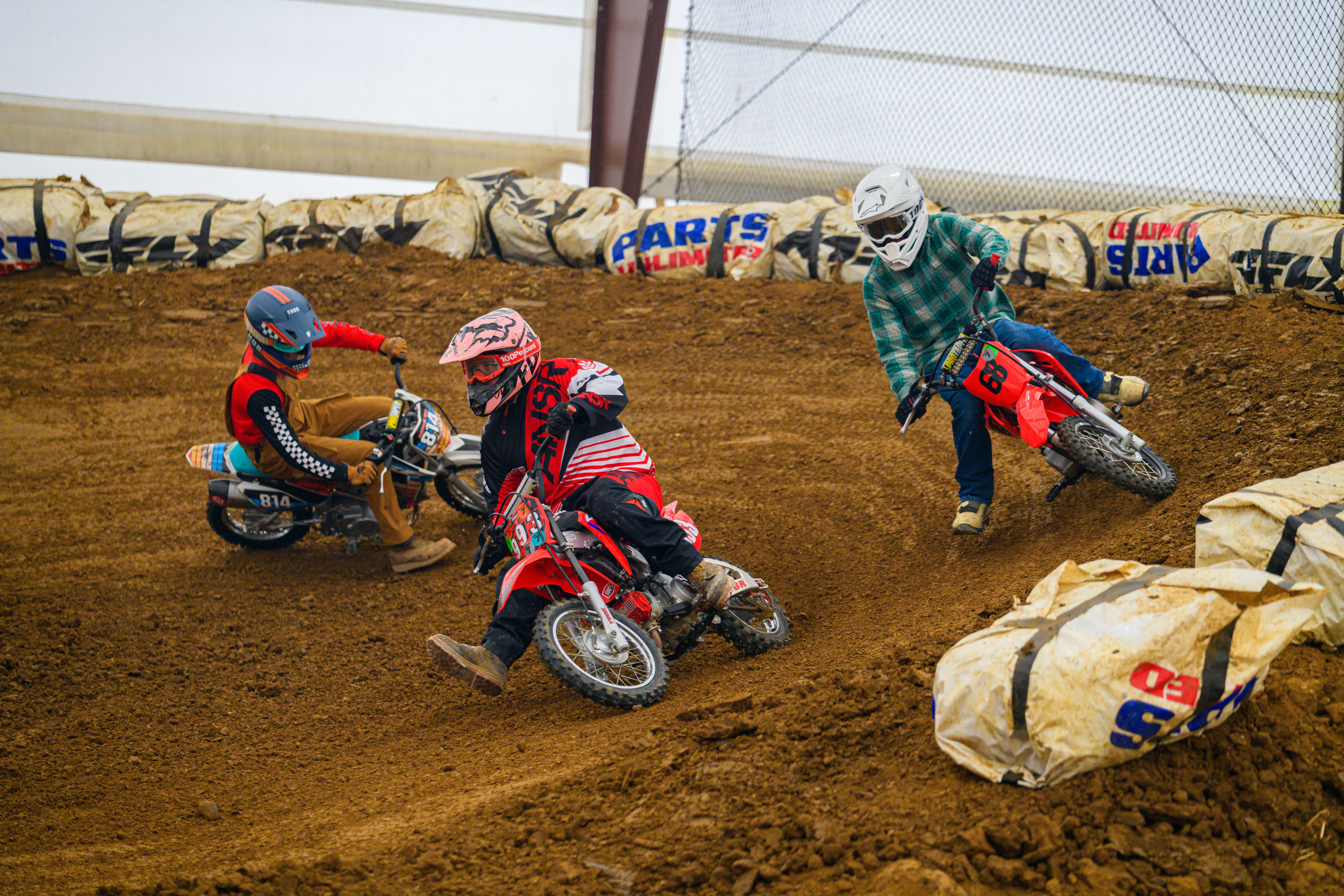 Intense Dirt Bike Race at Indoor Track · Free Stock Photo