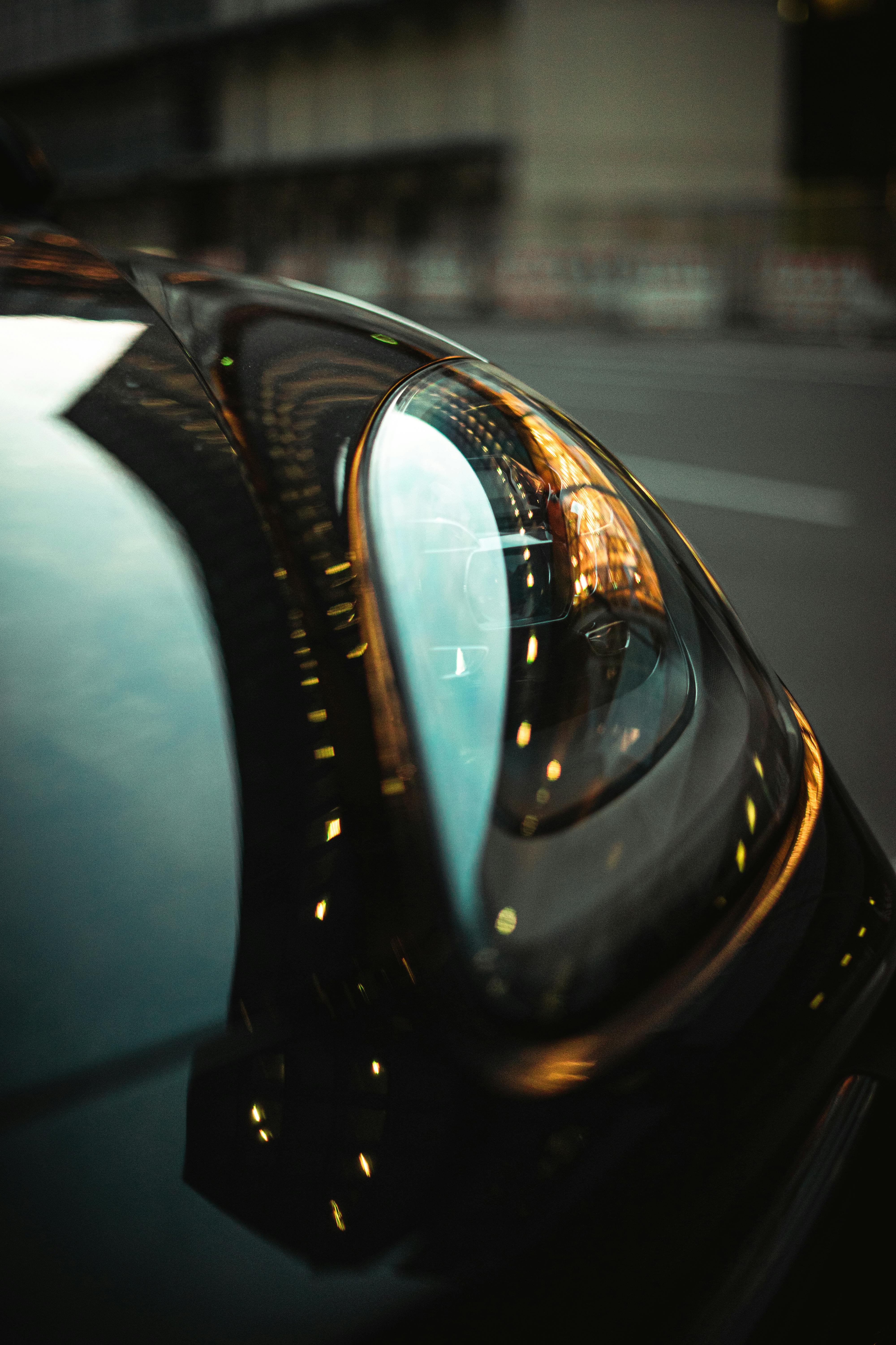 Close Up Shot of a Car Headlight · Free Stock Photo