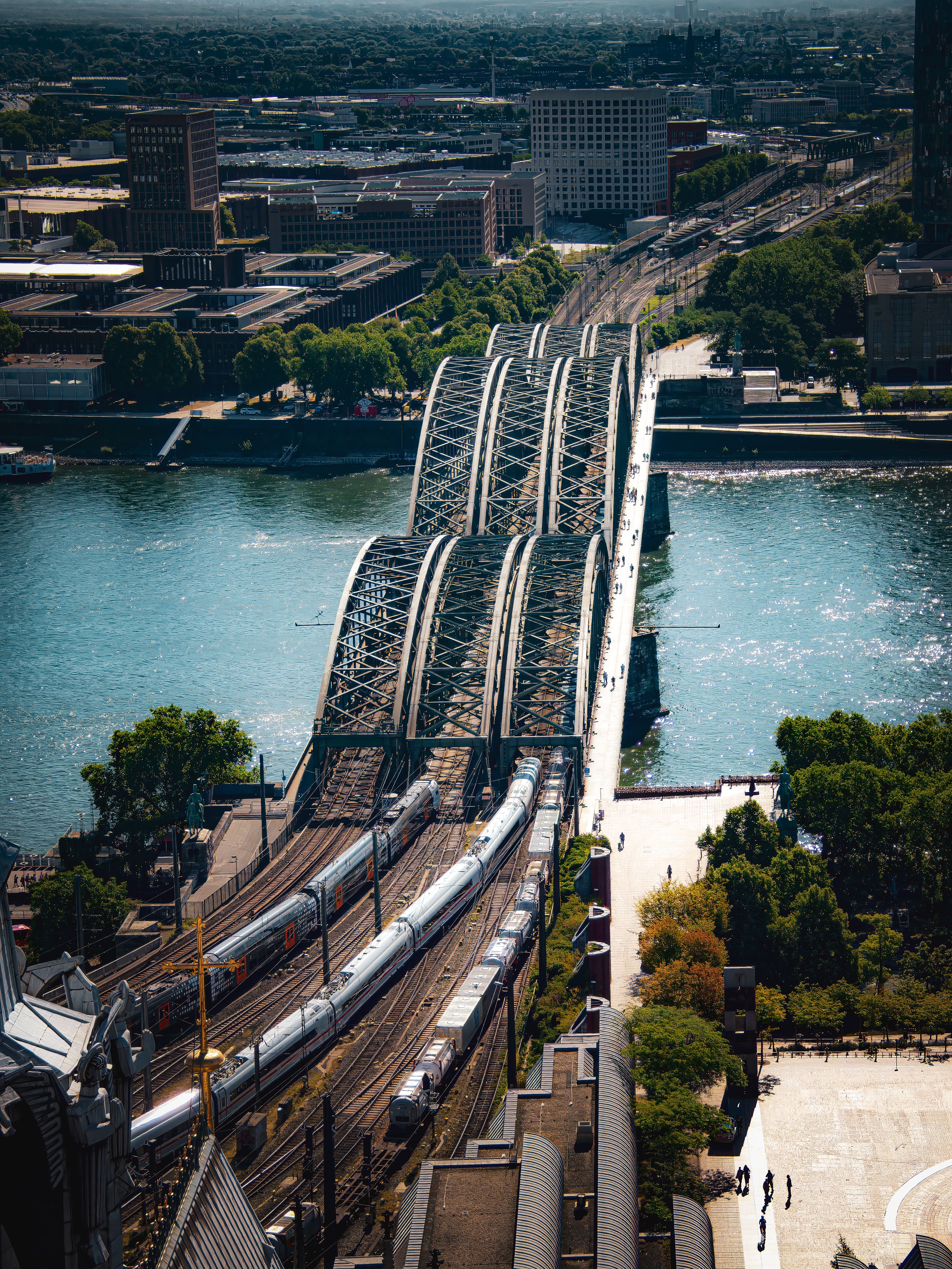 Aerial View of Bridge and Trains Over River · Free Stock Photo