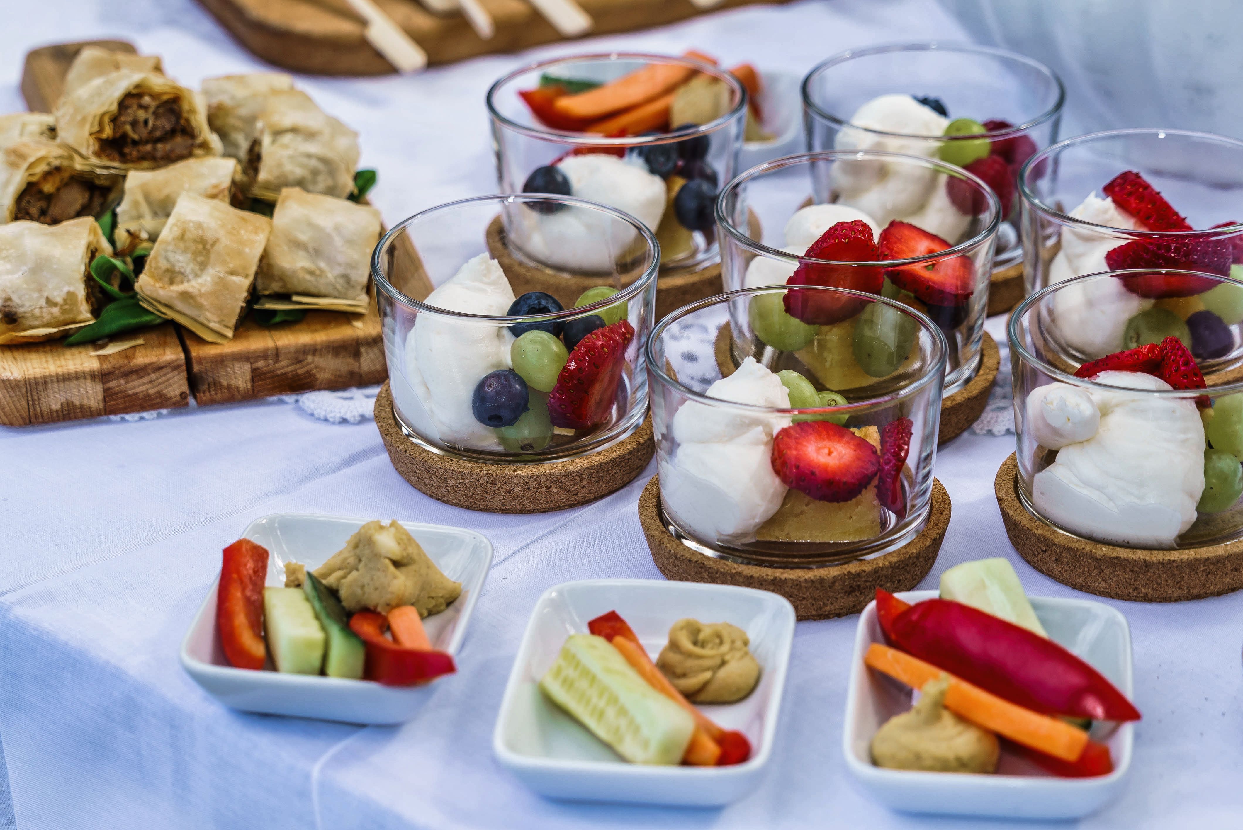 Gourmet Picnic Setup with Wine and Snacks · Free Stock Photo