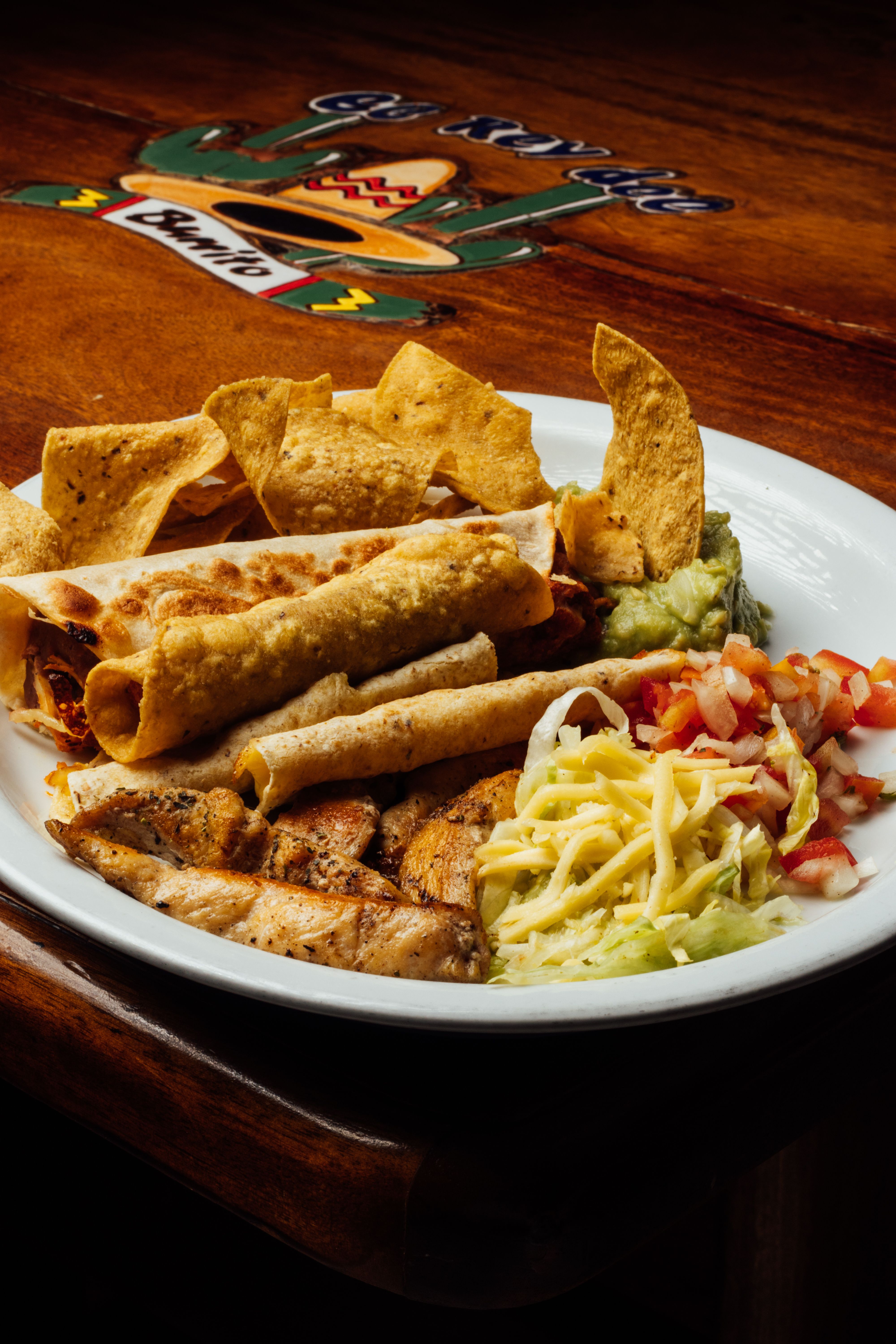 Authentic Mexican Platter with Tacos and Grilled Chicken · Free Stock Photo