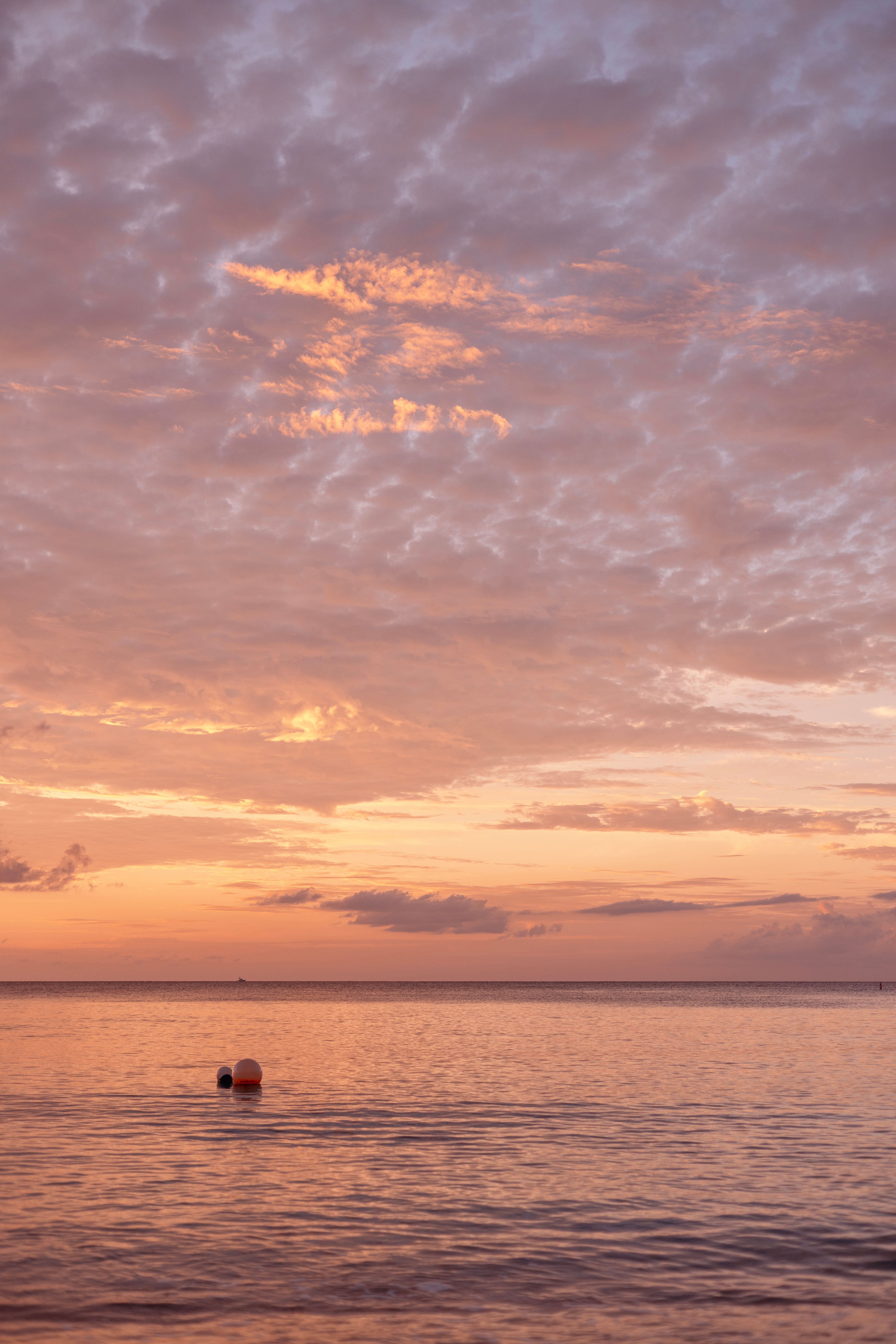 Serene Sunset Over Caribbean Sea in Cayman Islands · Free Stock Photo