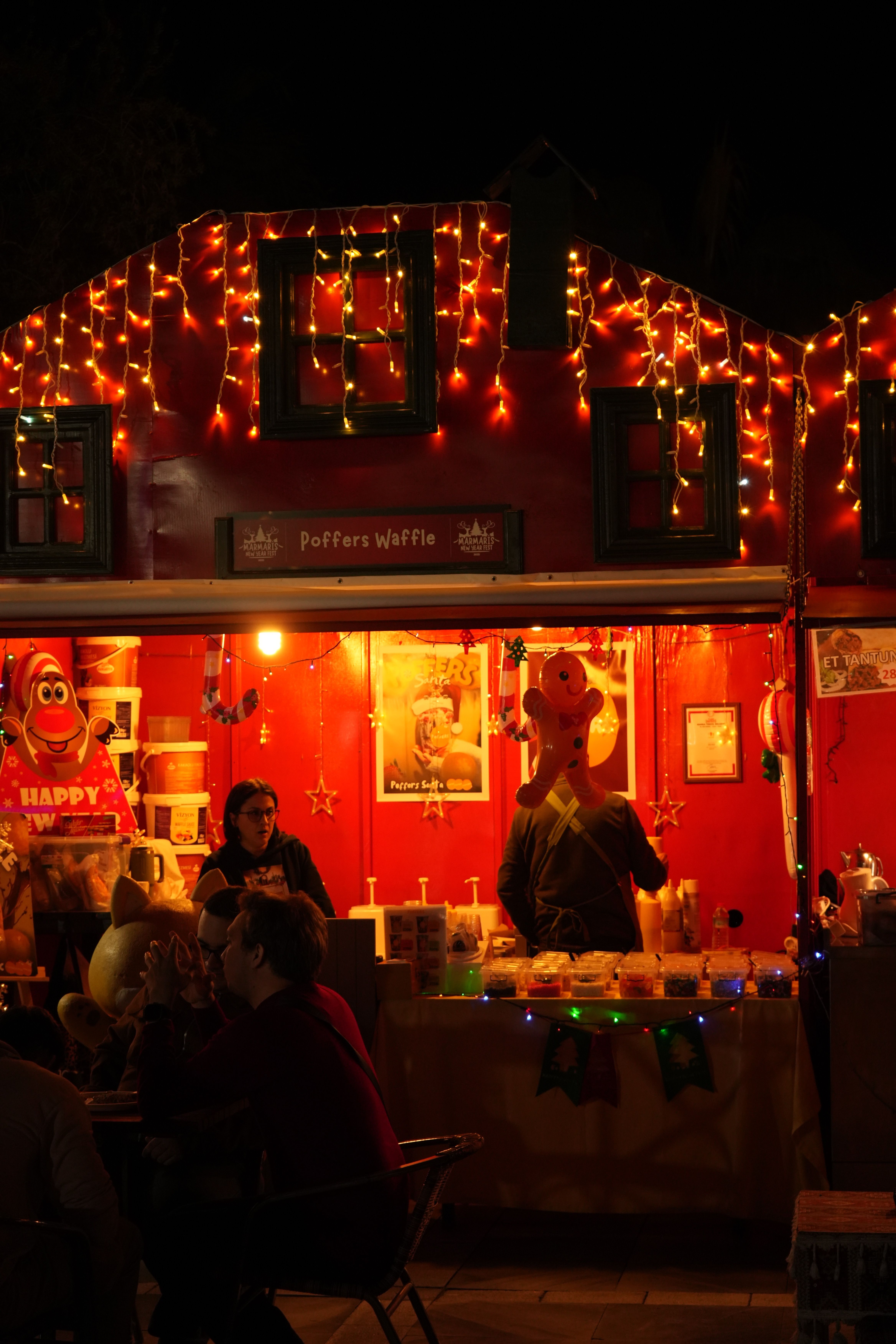 Festive Night Market with Waffle Stand · Free Stock Photo