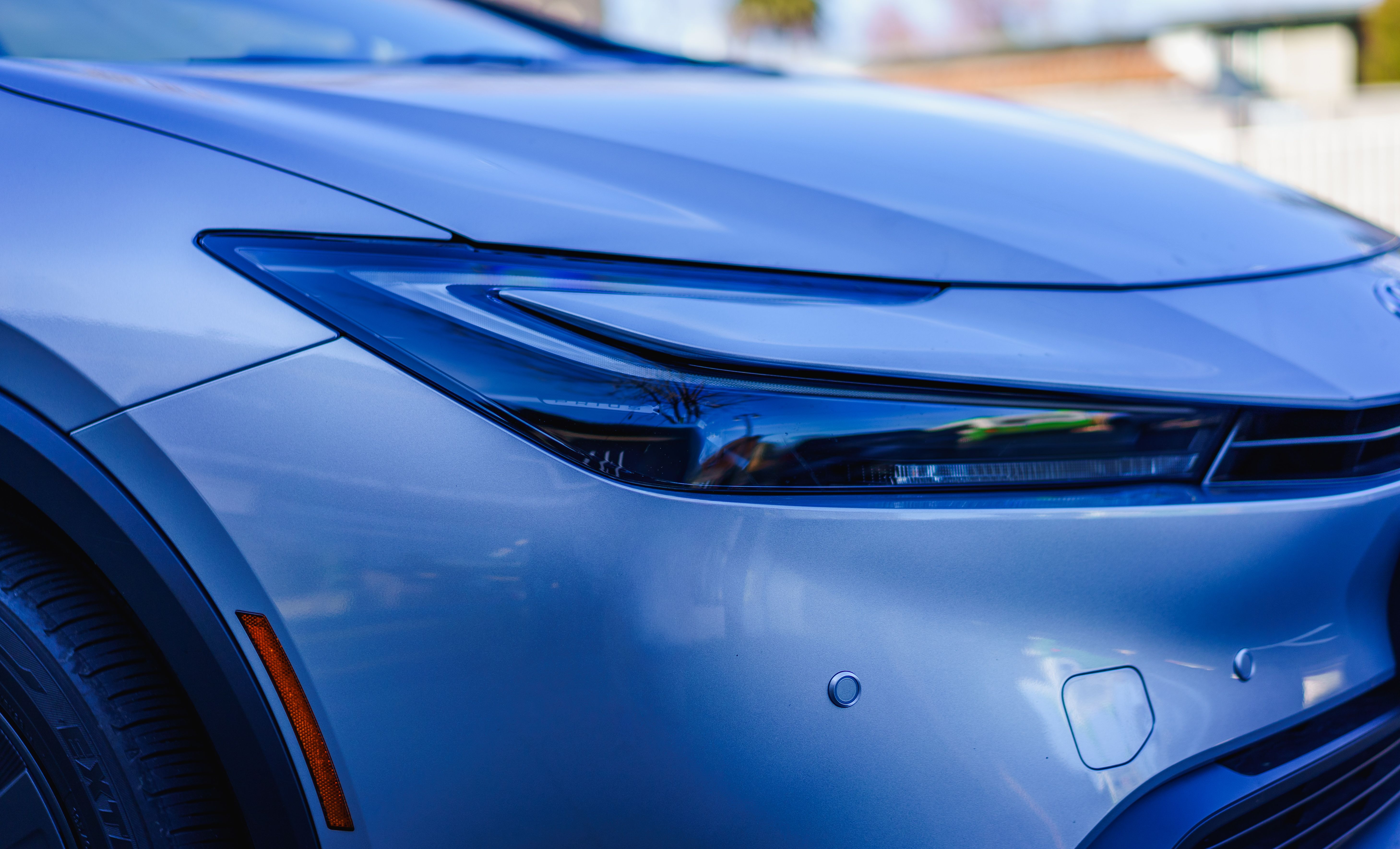 Close-Up of Modern Car Headlight Design · Free Stock Photo
