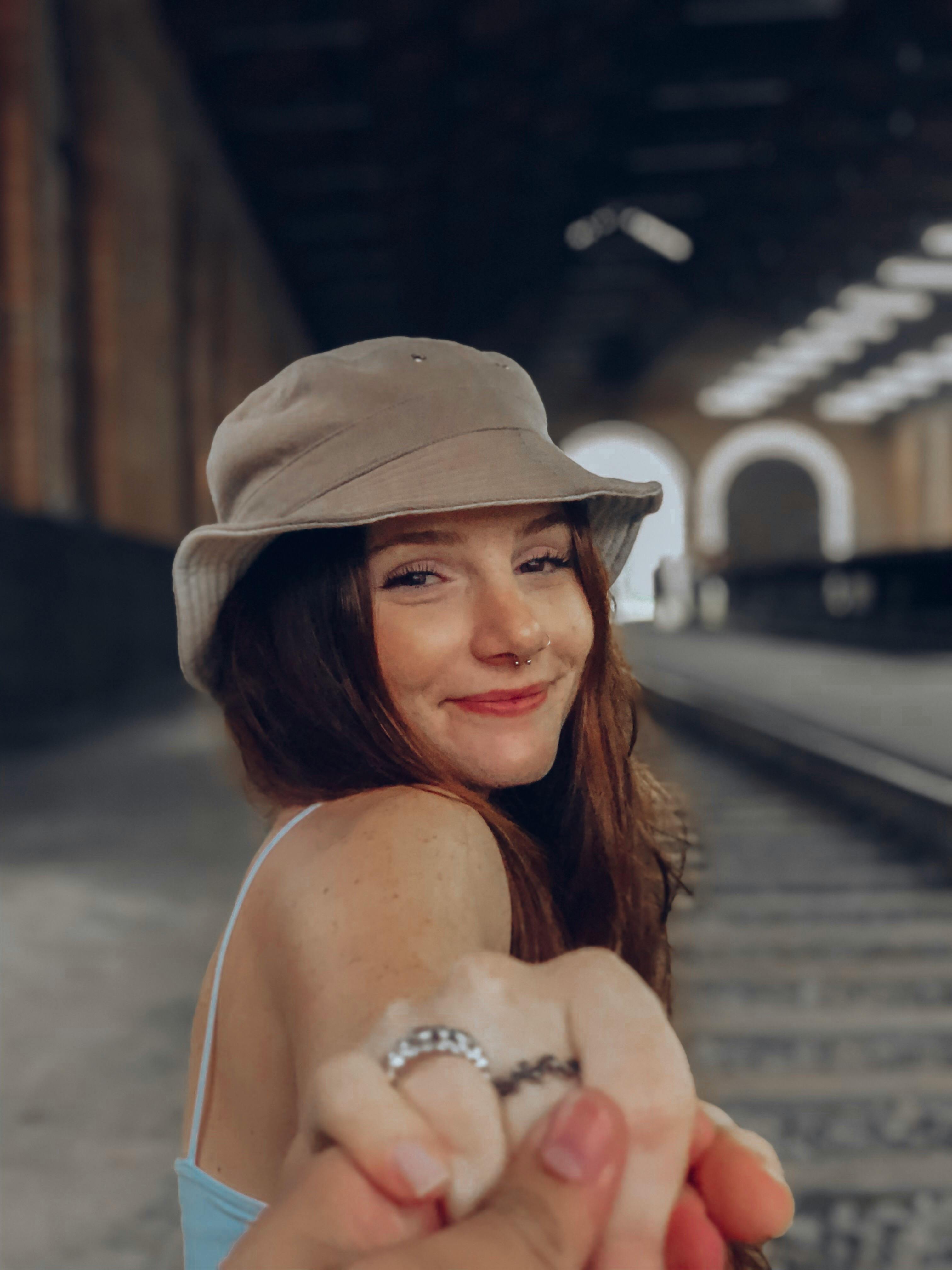 Woman Wearing Bucket Hat · Free Stock Photo