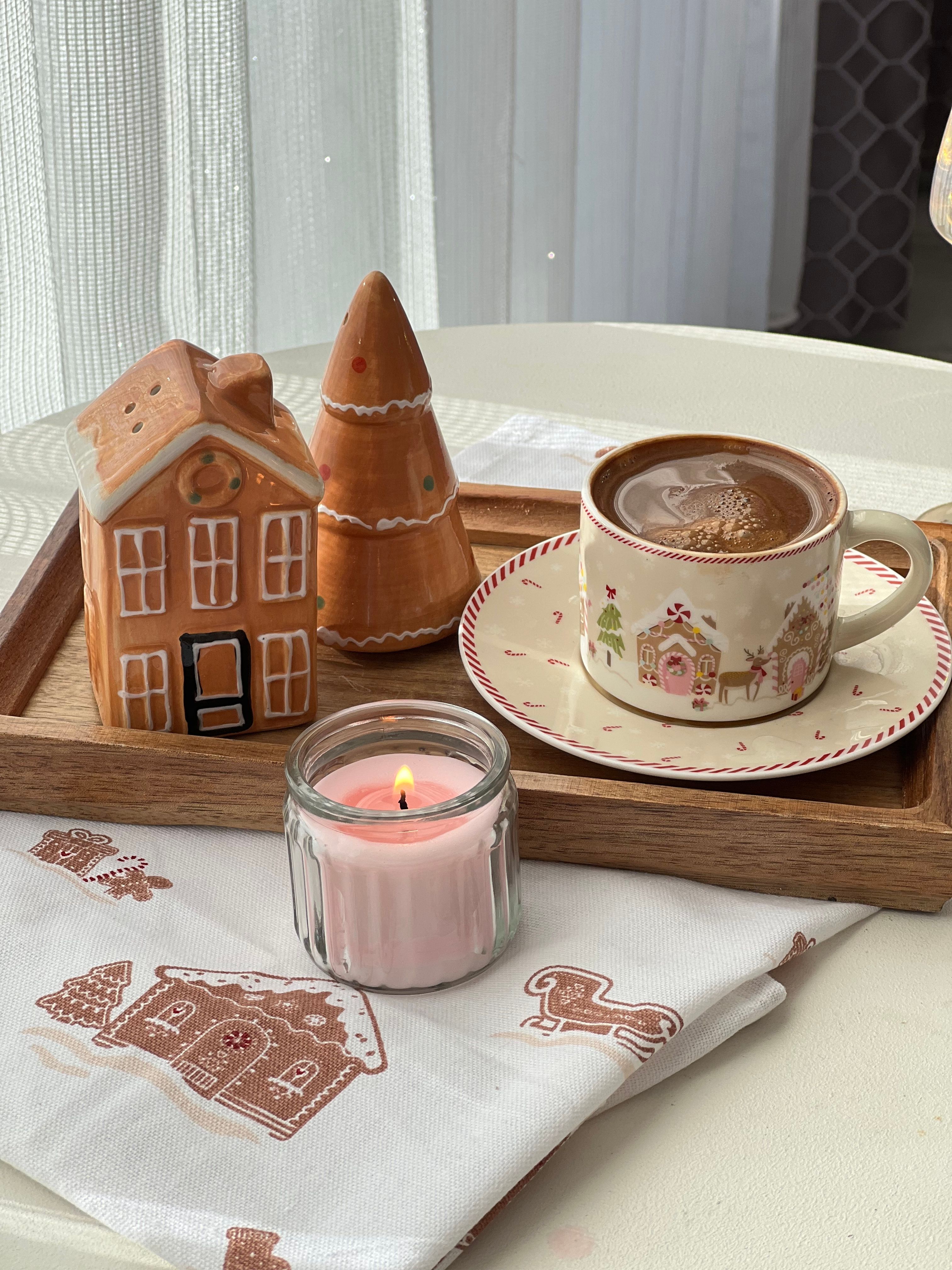 Cozy Winter Scene with Hot Cocoa and Gingerbread Decor · Free Stock Photo