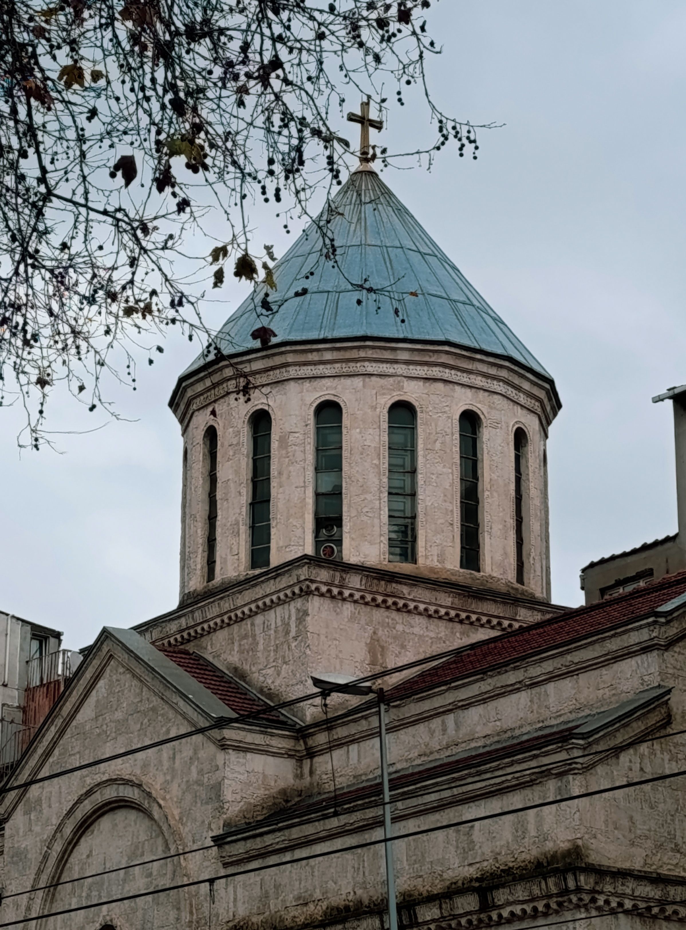 Historic Church Dome with Cross in Cityscape · Free Stock Photo