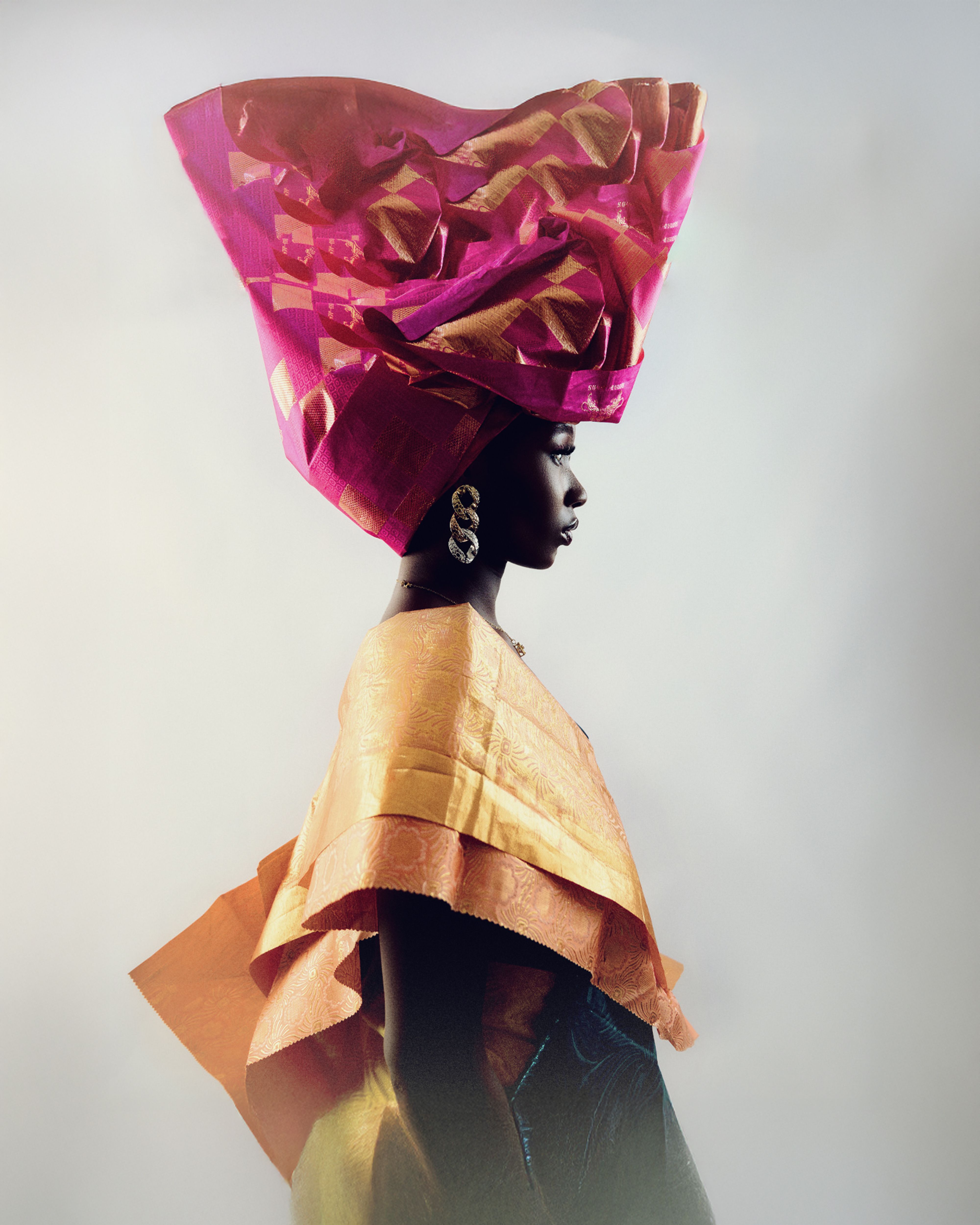 Elegant African Woman in Traditional Gele Headdress · Free Stock Photo
