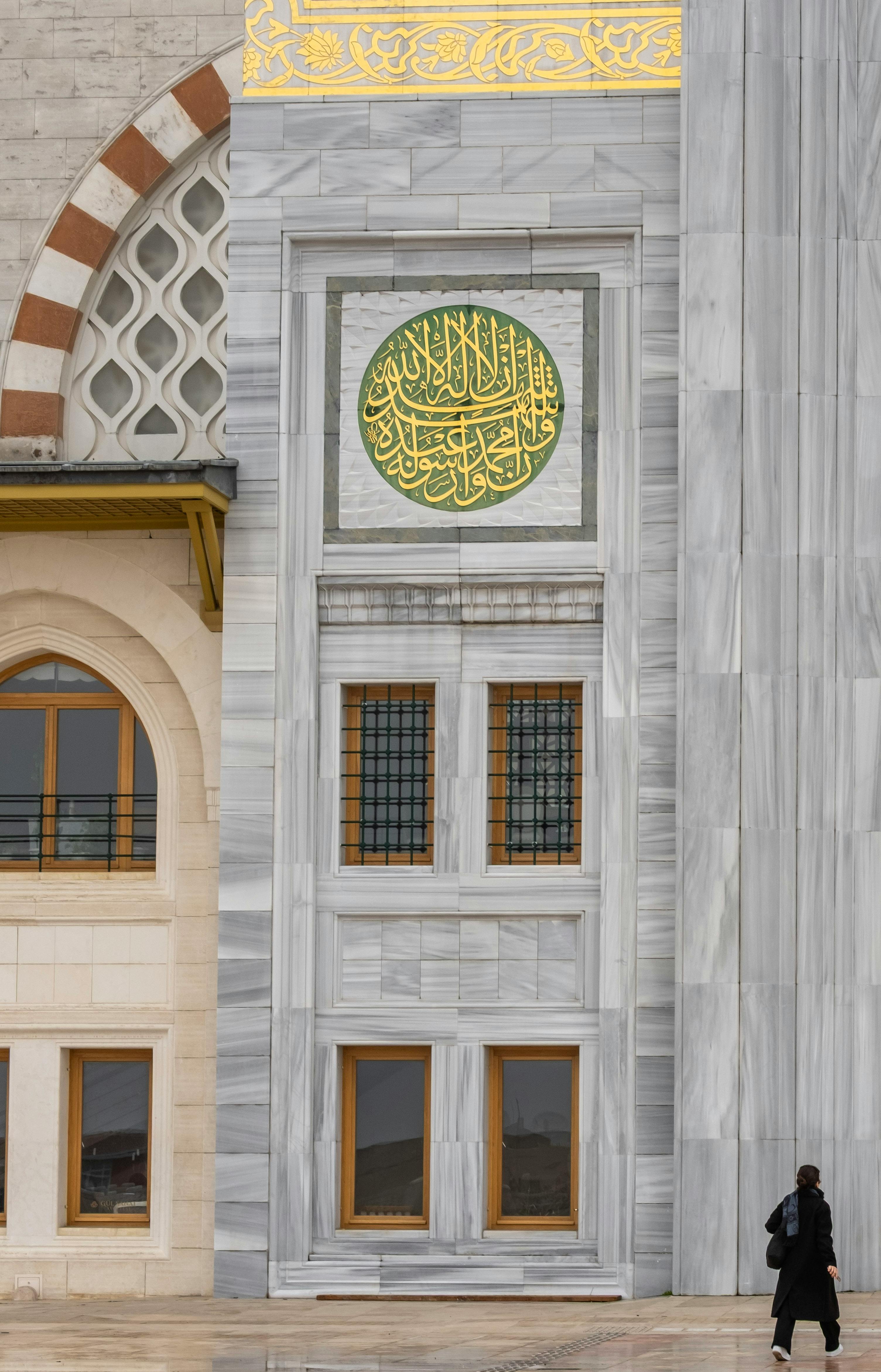 Elegant Mosque Facade with Arabic Calligraphy · Free Stock Photo