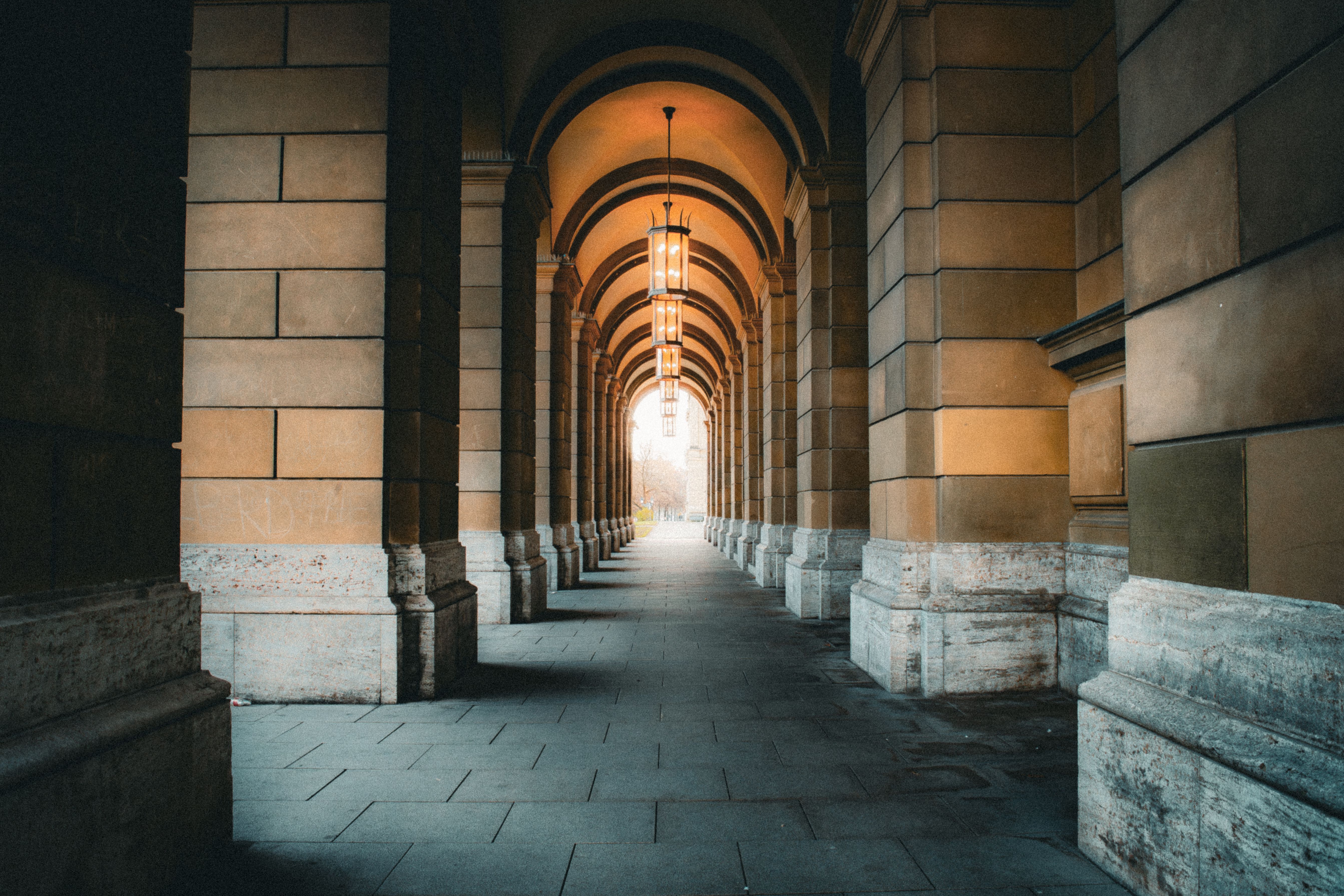 Elegant Archway Corridor in Munich, Germany · Free Stock Photo