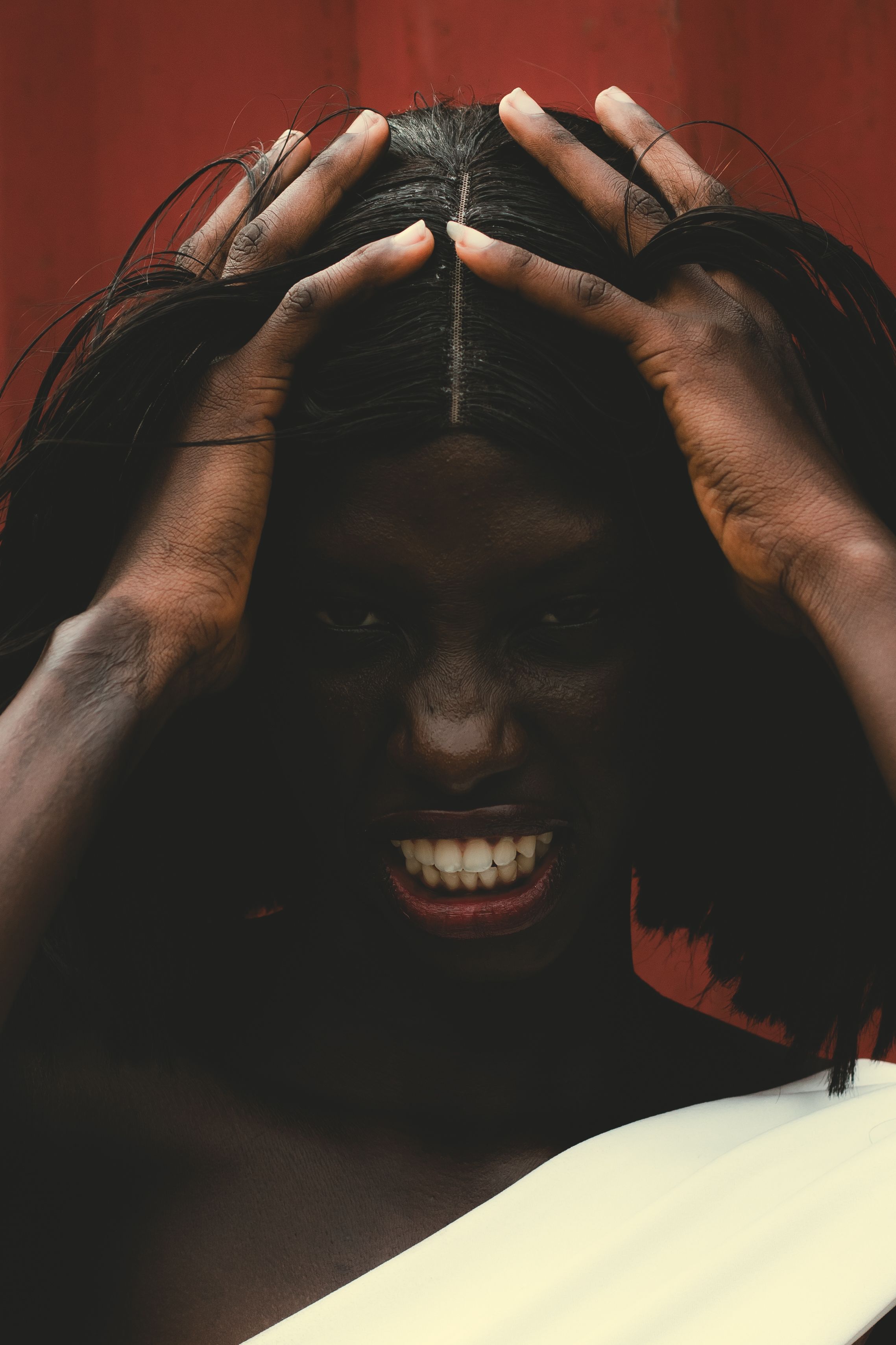 Dramatic Portrait of Woman with Intense Expression · Free Stock Photo