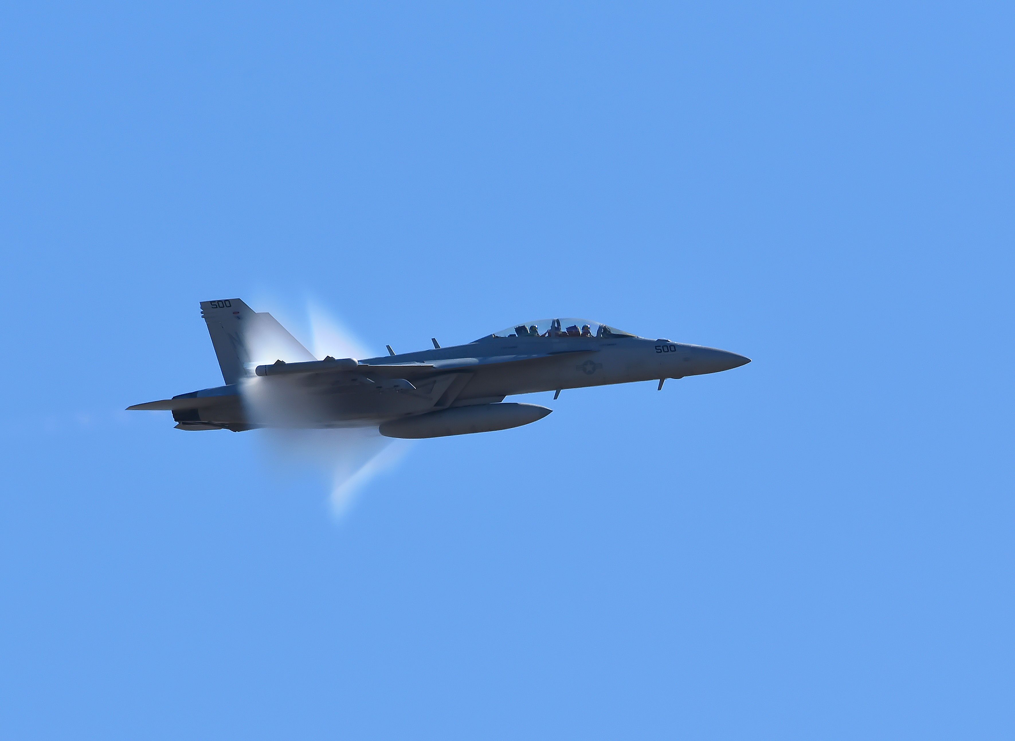 Jet Fighter Breaking the Sound Barrier Mid-Flight · Free Stock Photo