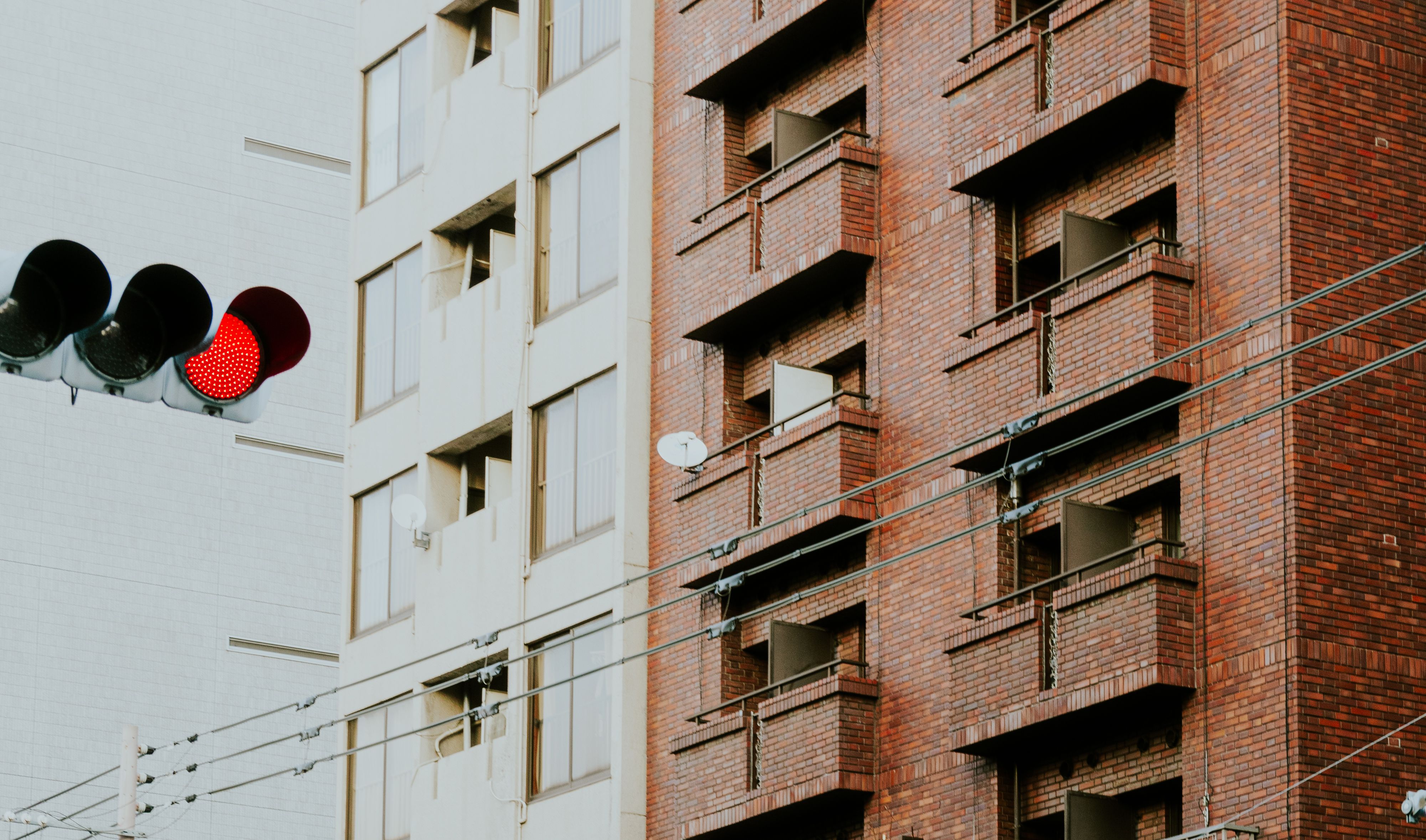 Urban Intersection with Red Traffic Light · Free Stock Photo