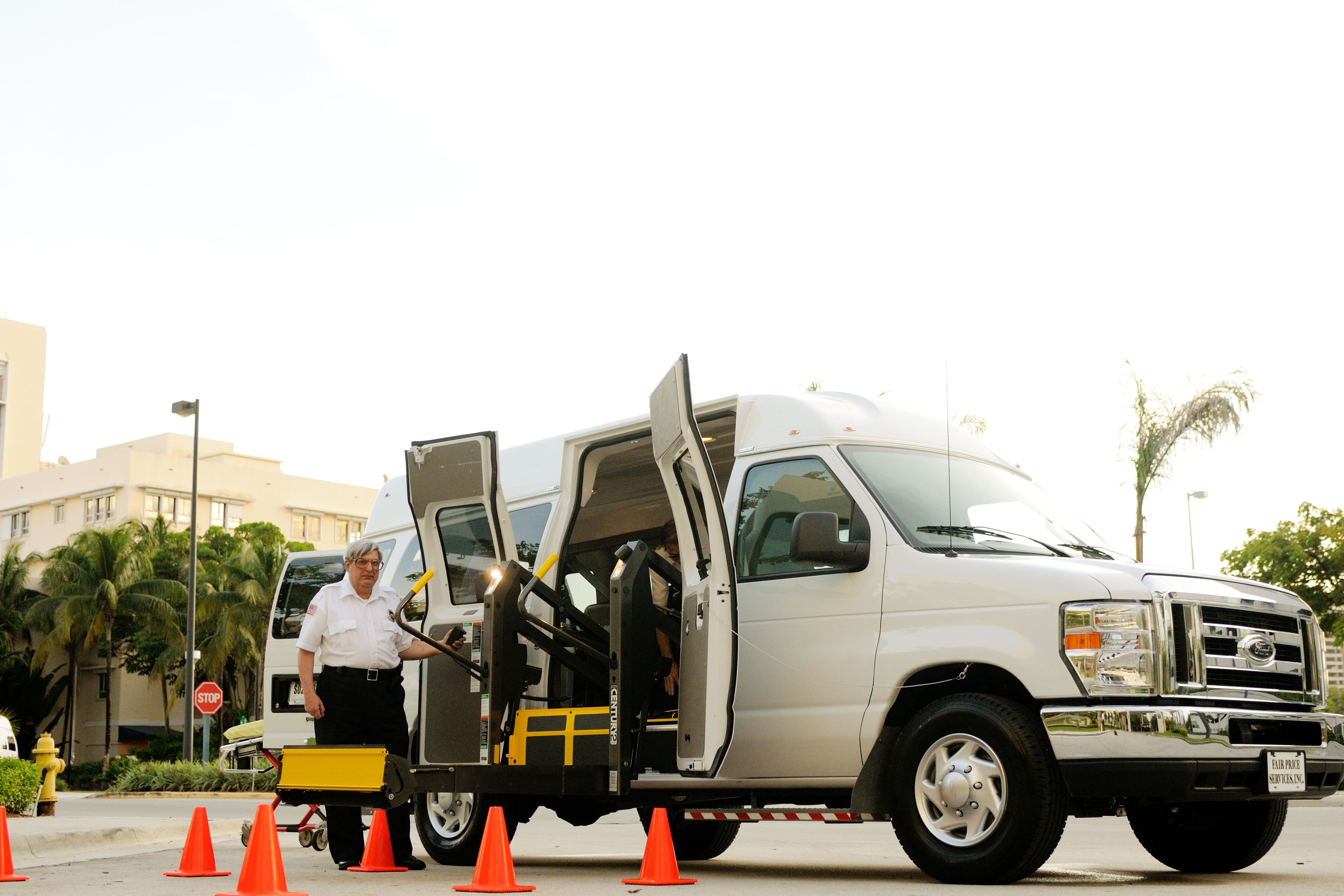 Wheelchair Accessible Van with Driver Outdoors · Free Stock Photo