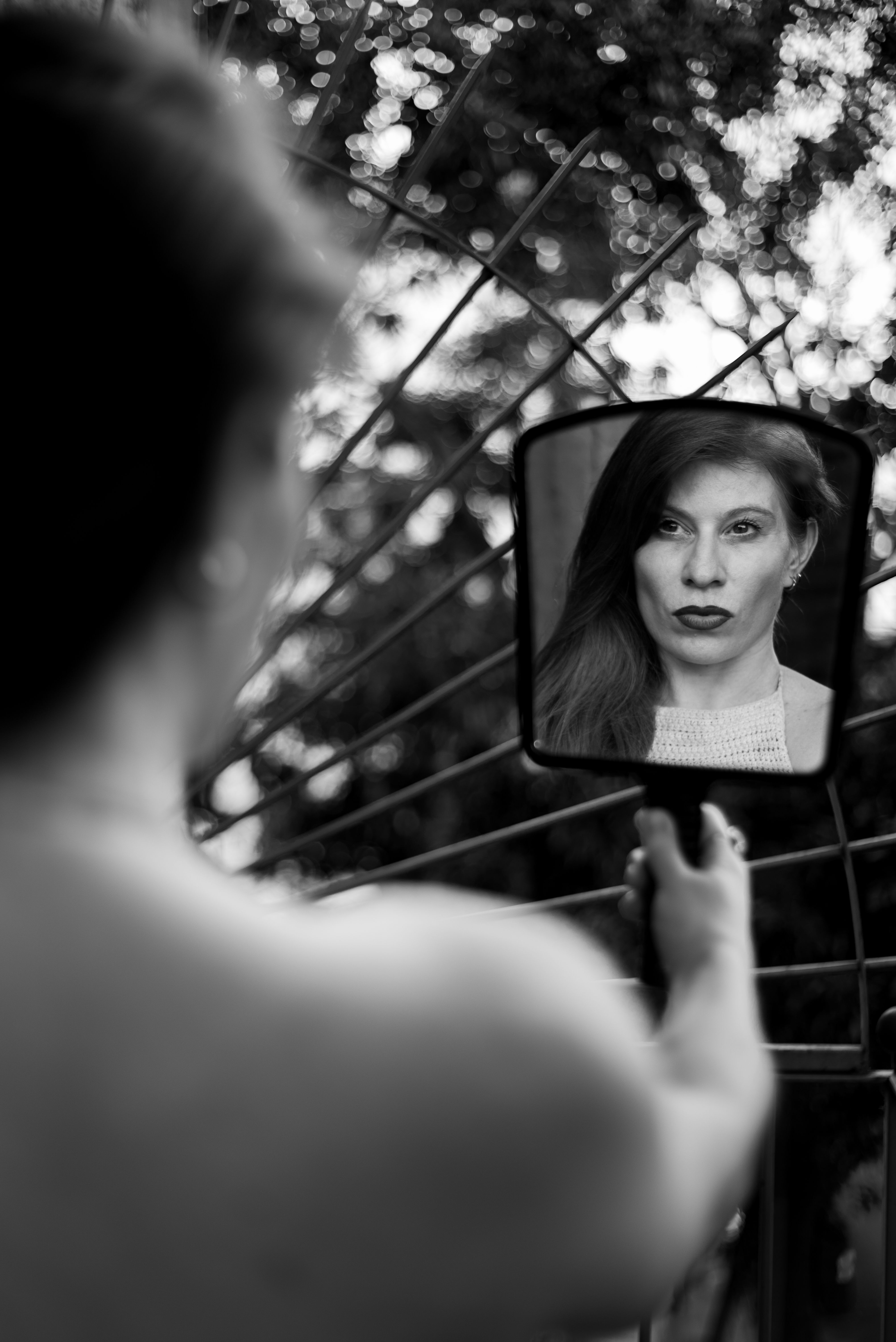 Monochrome Woman's Reflection in Outdoor Mirror · Free Stock Photo