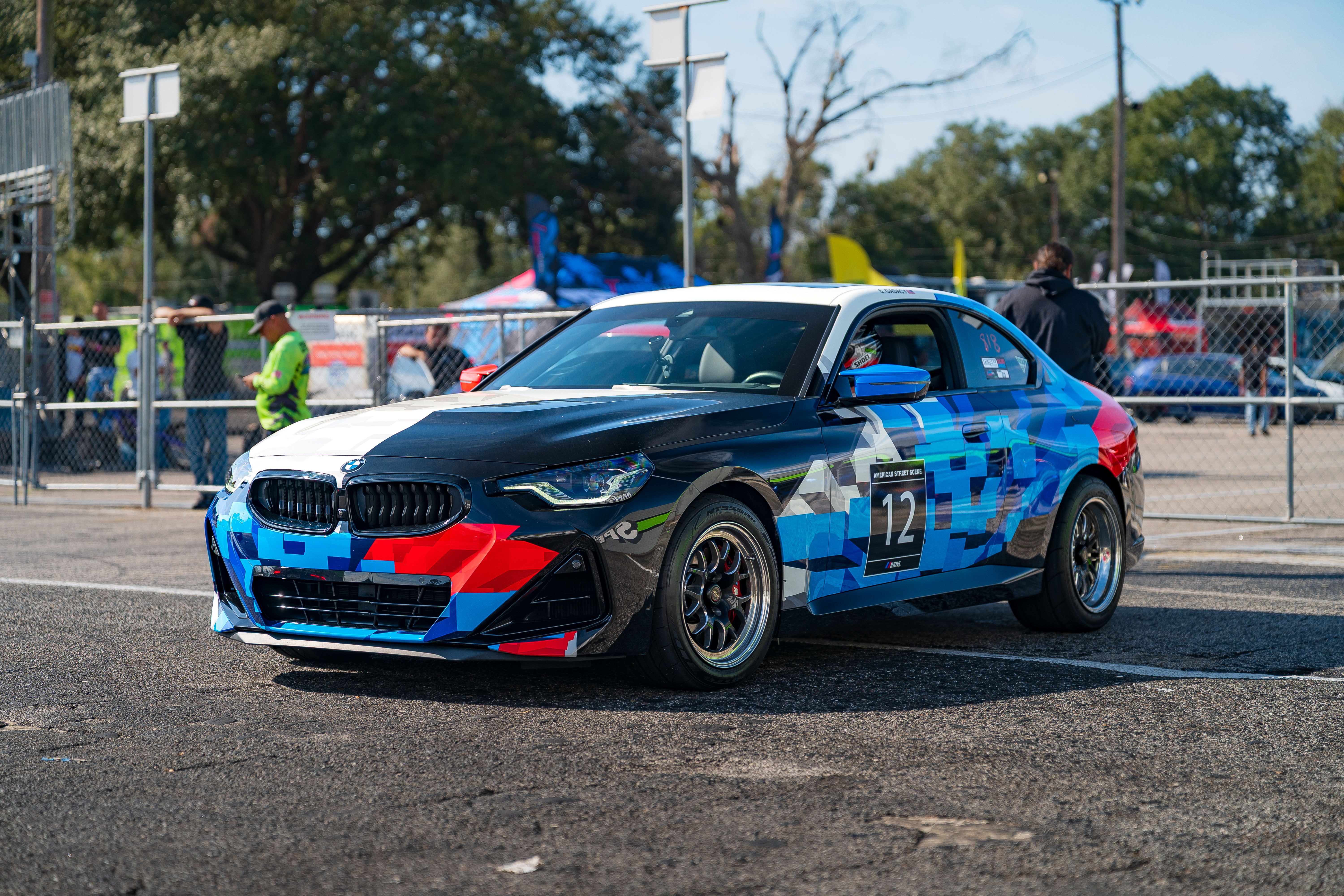 Colorful Car at Outdoor Racing Event · Free Stock Photo