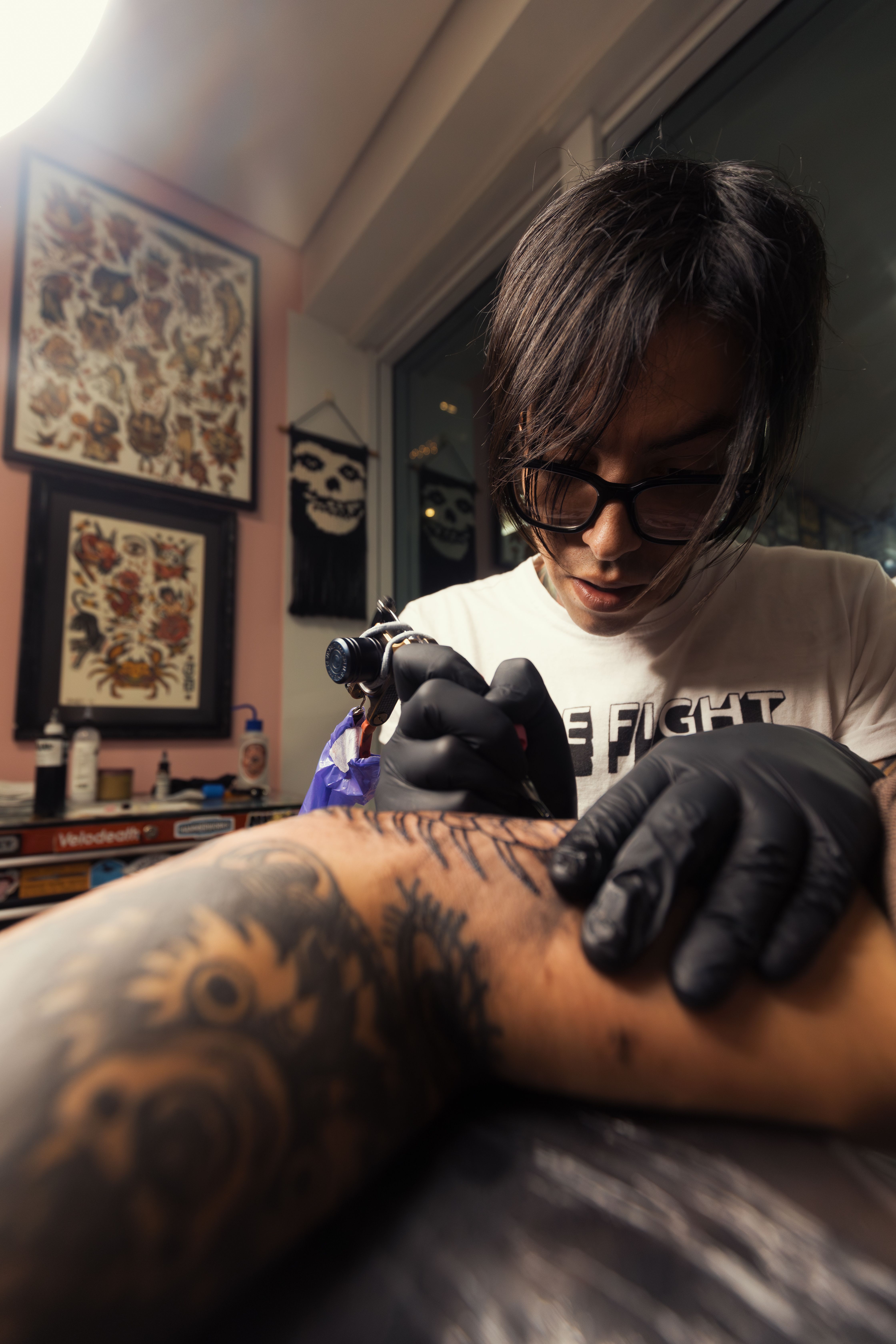 Tattoo Artist Creating Intricate Design in Studio · Free Stock Photo