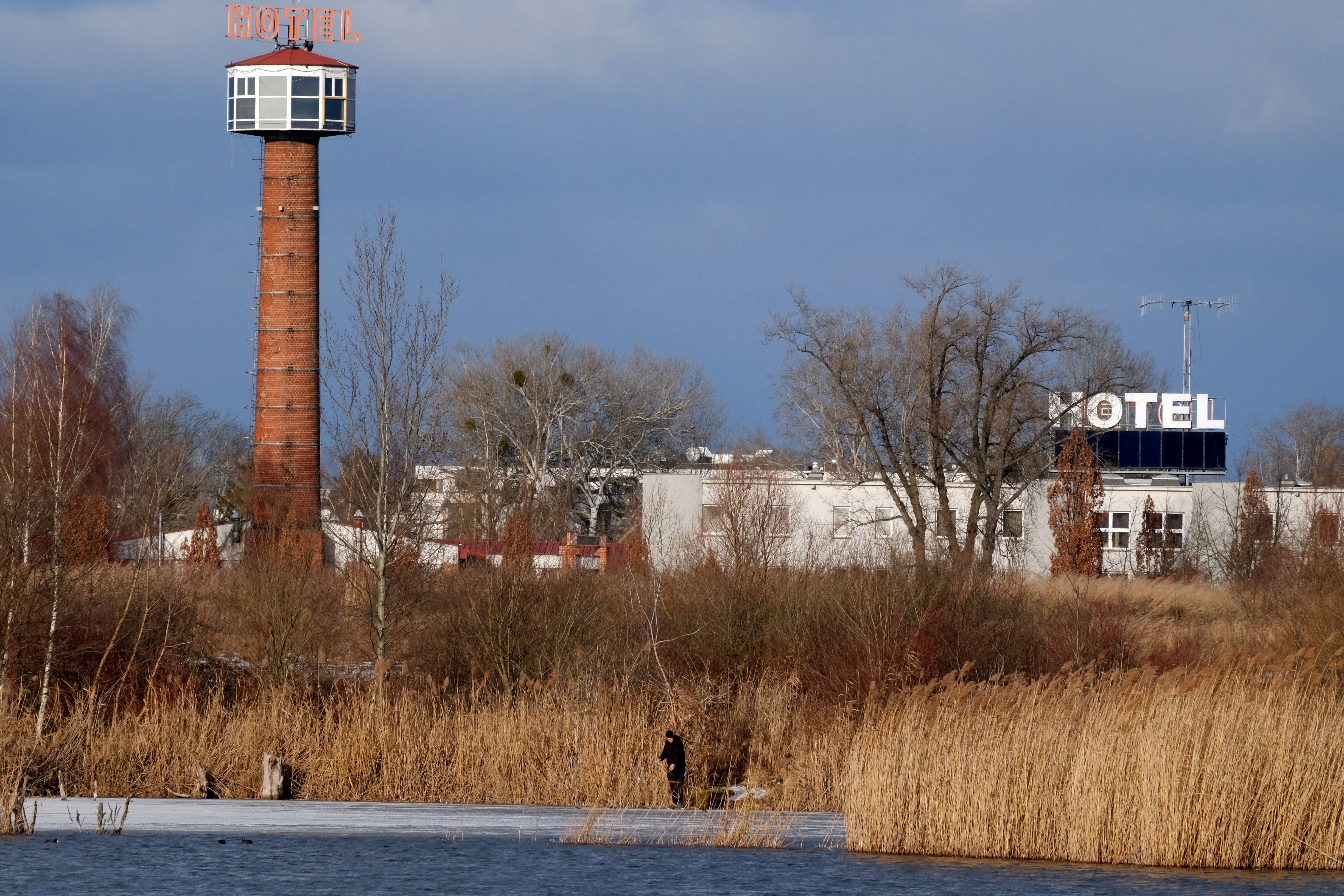 Rural Motel Tower and Landscape in Winter · Free Stock Photo
