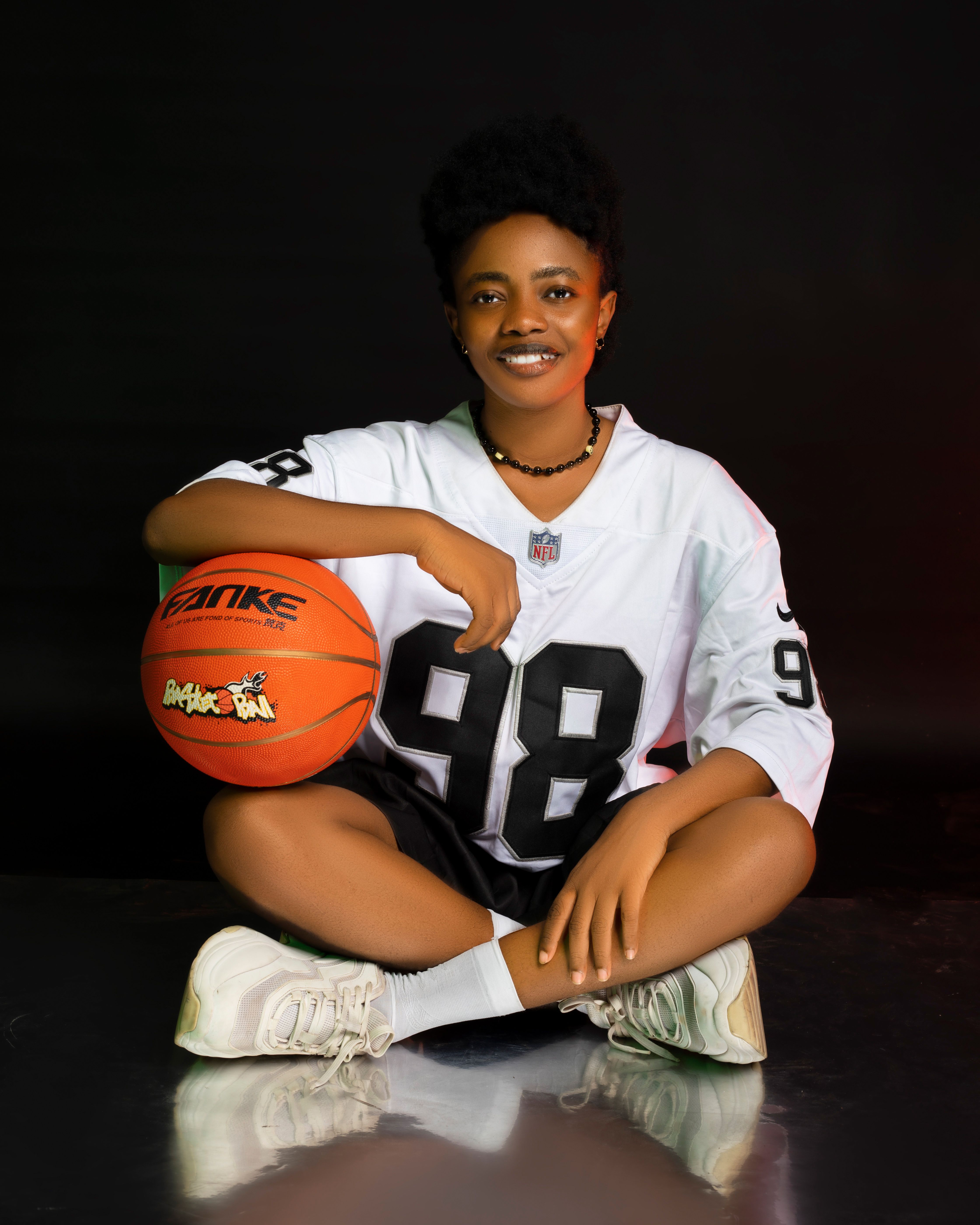 Confident Basketball Player Posing in Studio · Free Stock Photo