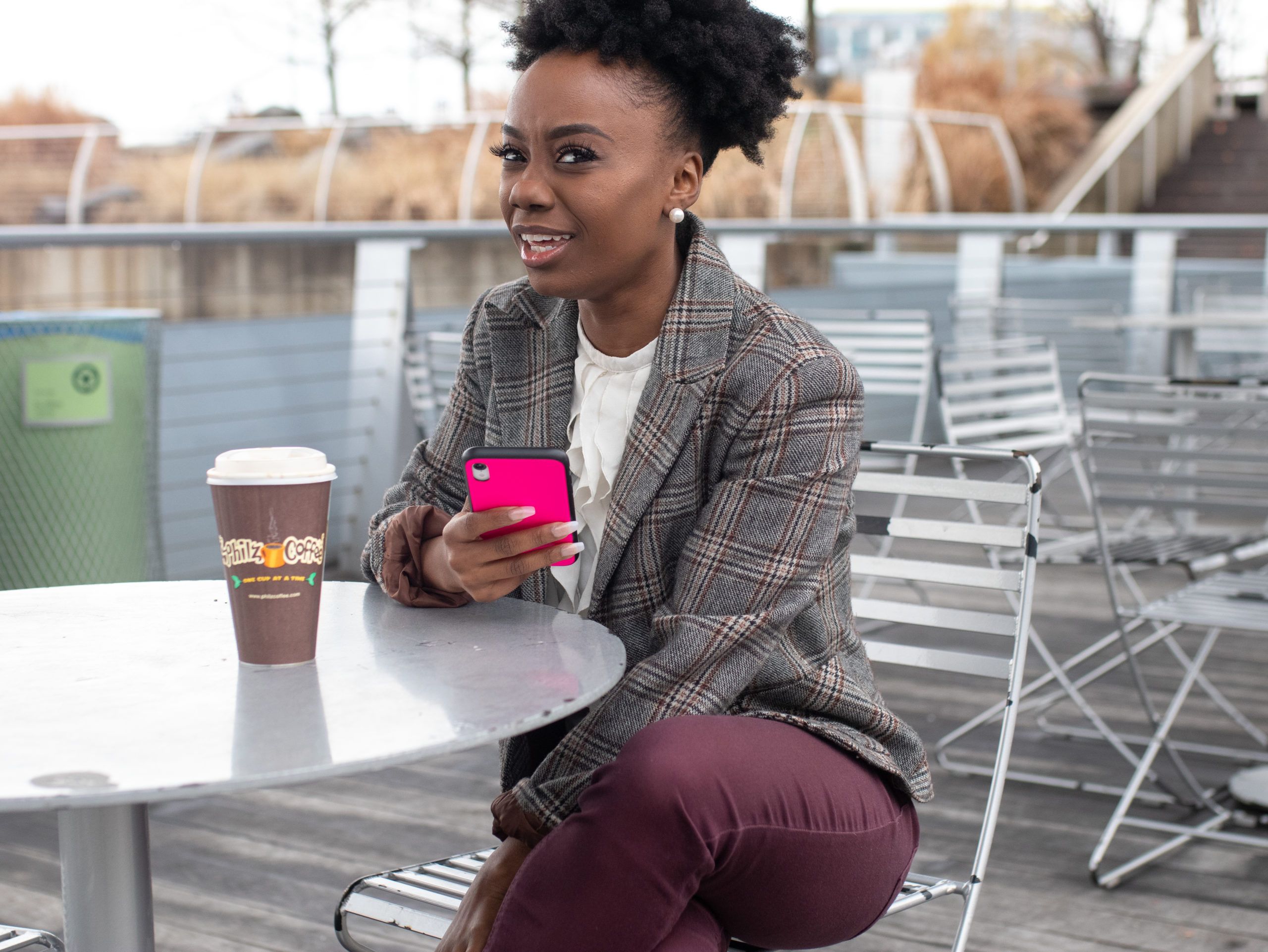 Woman Holding Smartphone with Pink Case · Free Stock Photo