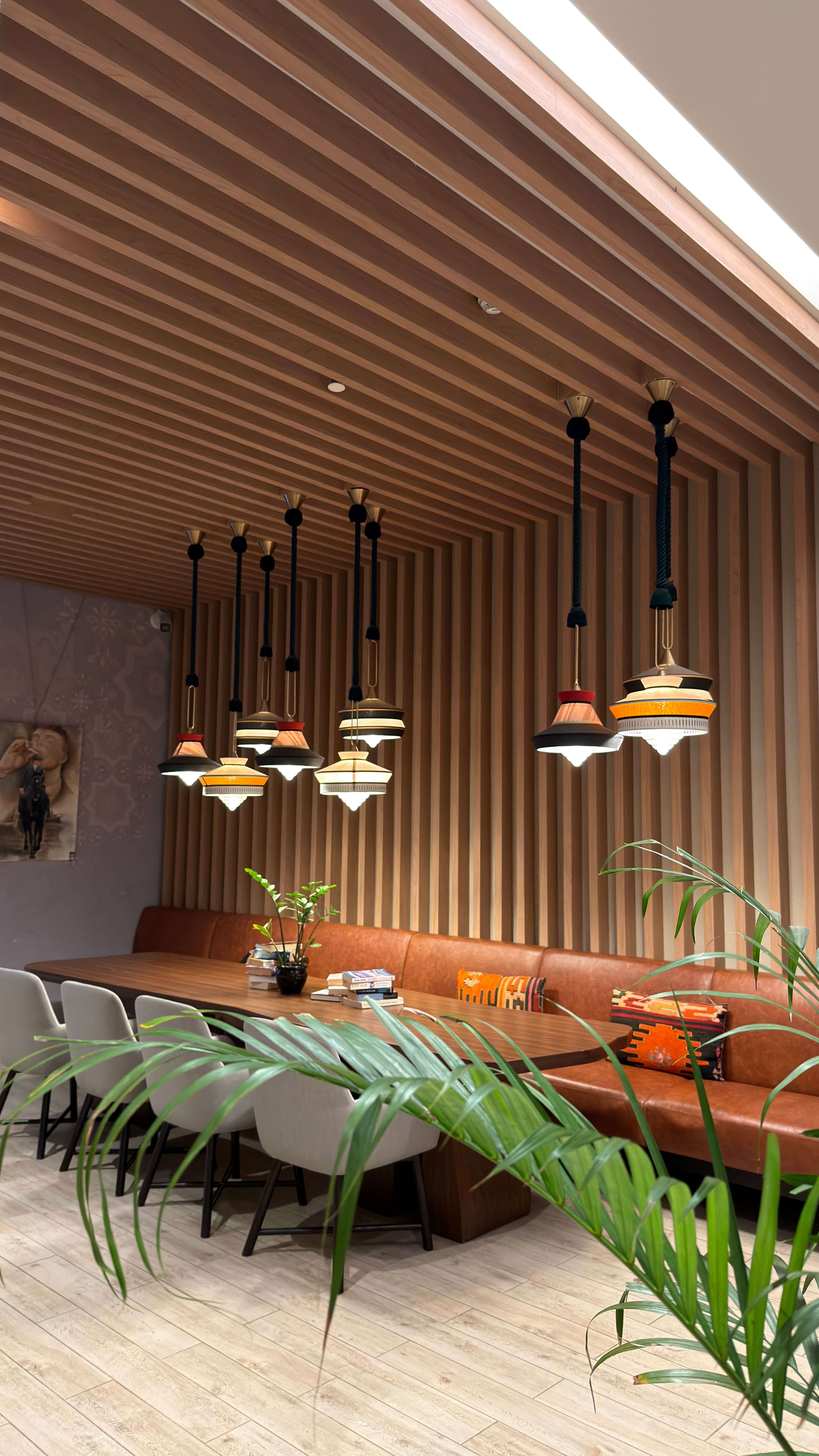 Elegant Modern Dining Area with Pendant Lights · Free Stock Photo
