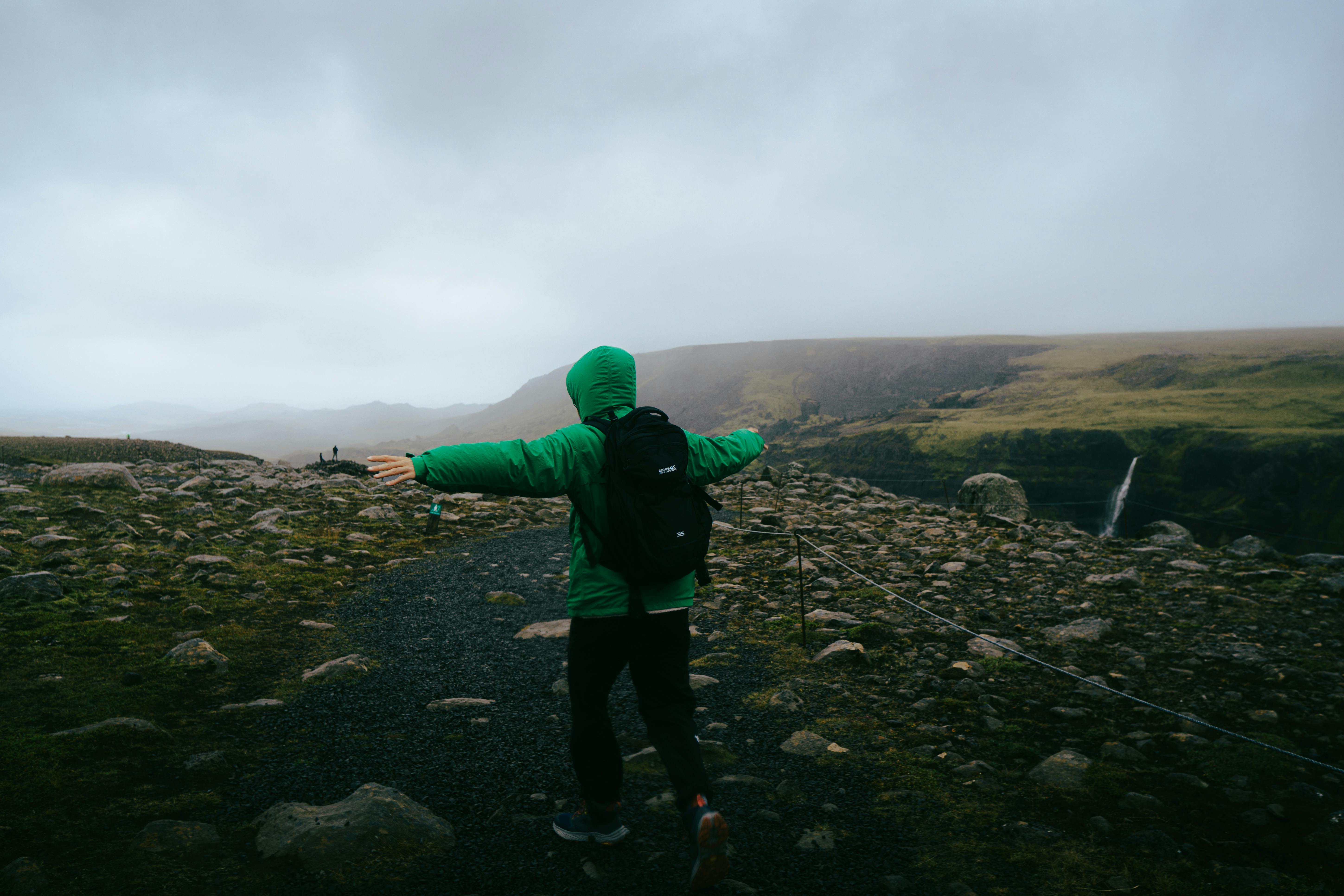 Adventurer Exploring Haifoss Waterfall in Iceland · Free Stock Photo