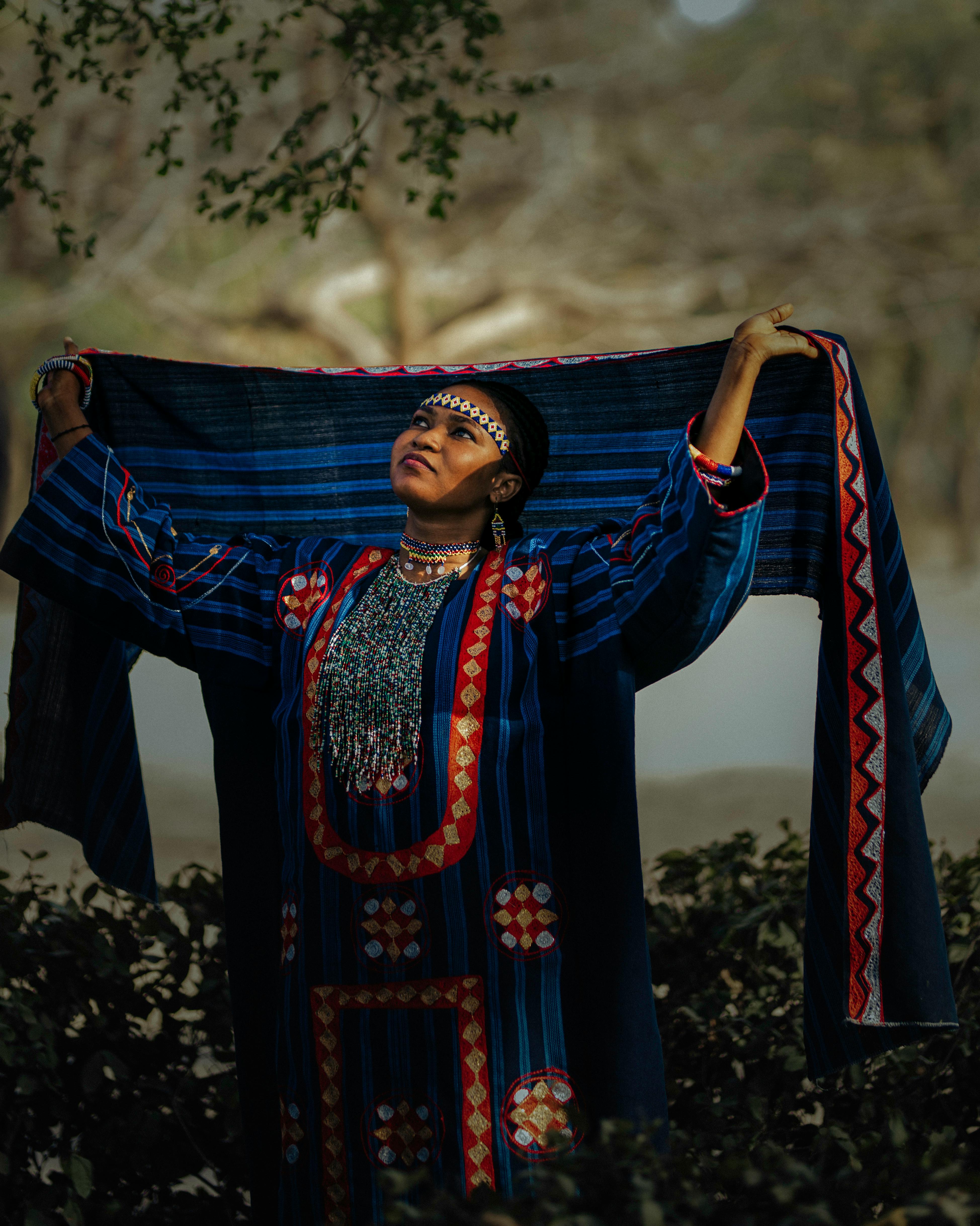 Traditional African Dress in Outdoor Setting · Free Stock Photo