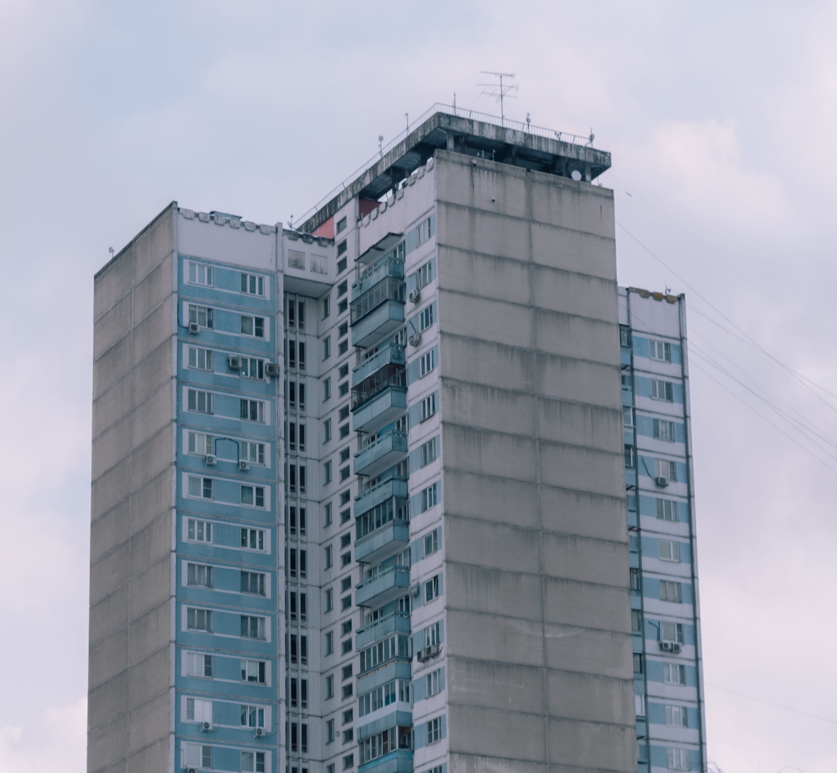 Modern High-Rise Residential Building Against Sky · Free Stock Photo