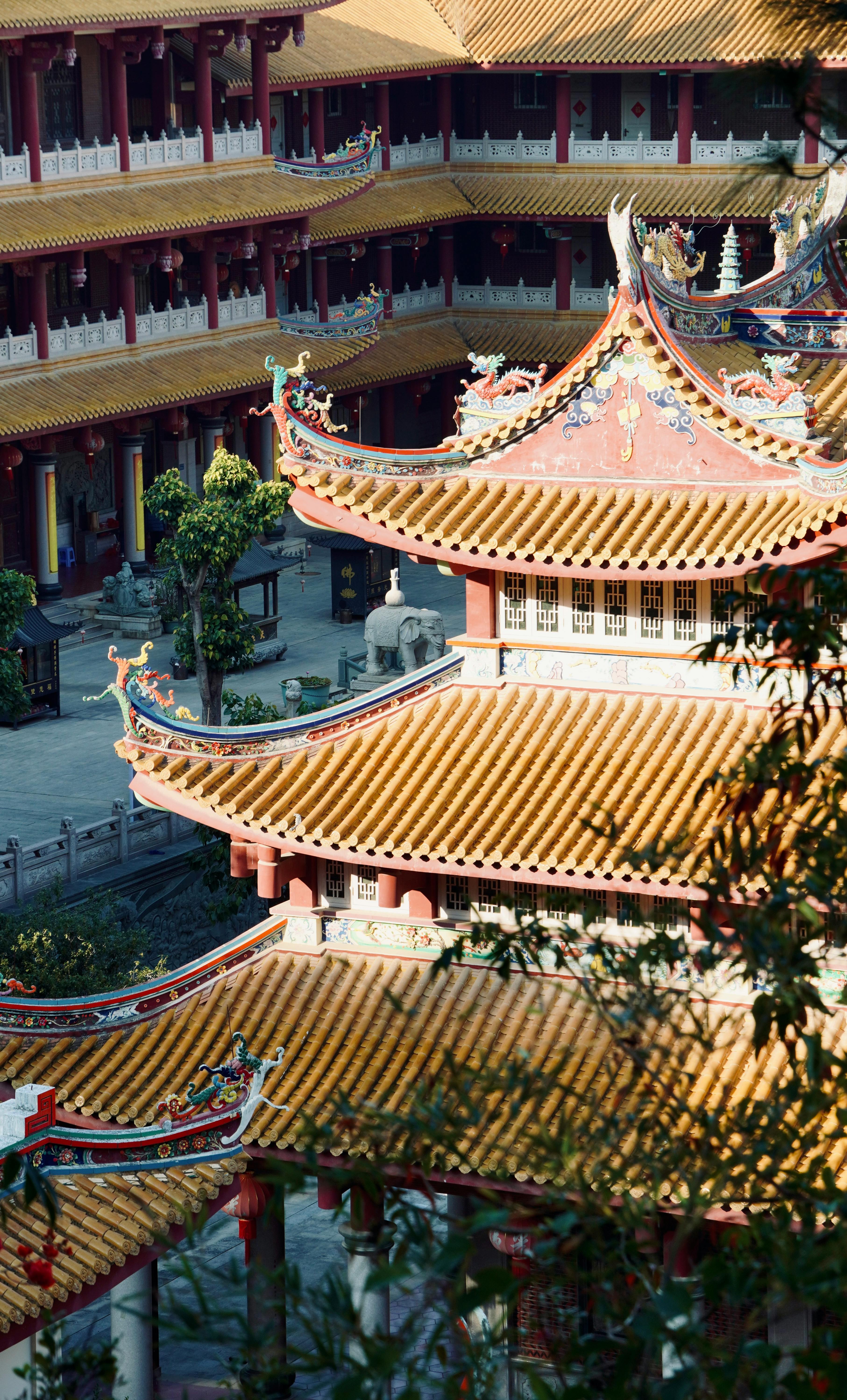 Traditional Chinese Architecture with Ornate Roofs · Free Stock Photo