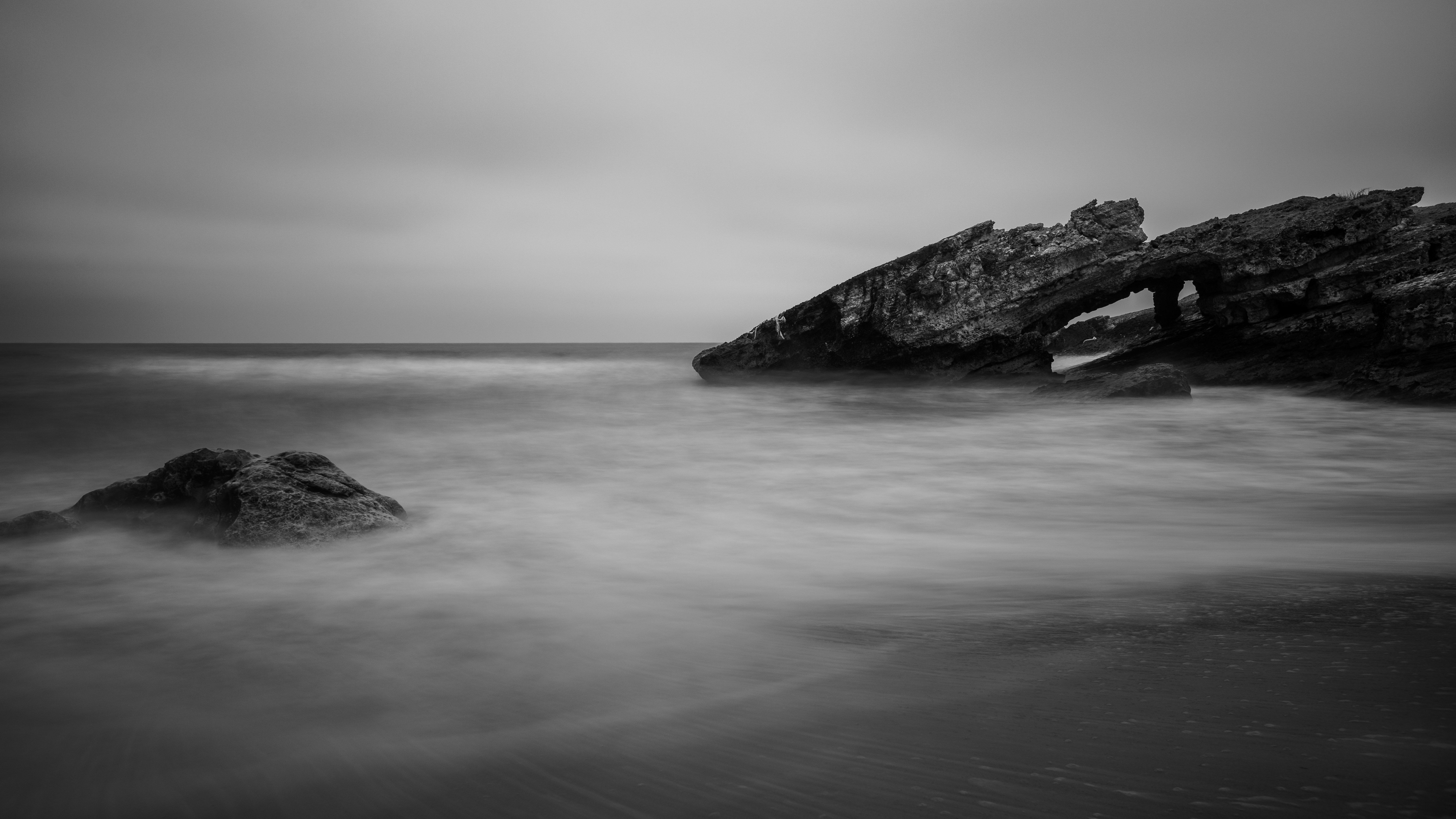 Gray Scale Photo of Body of Water · Free Stock Photo