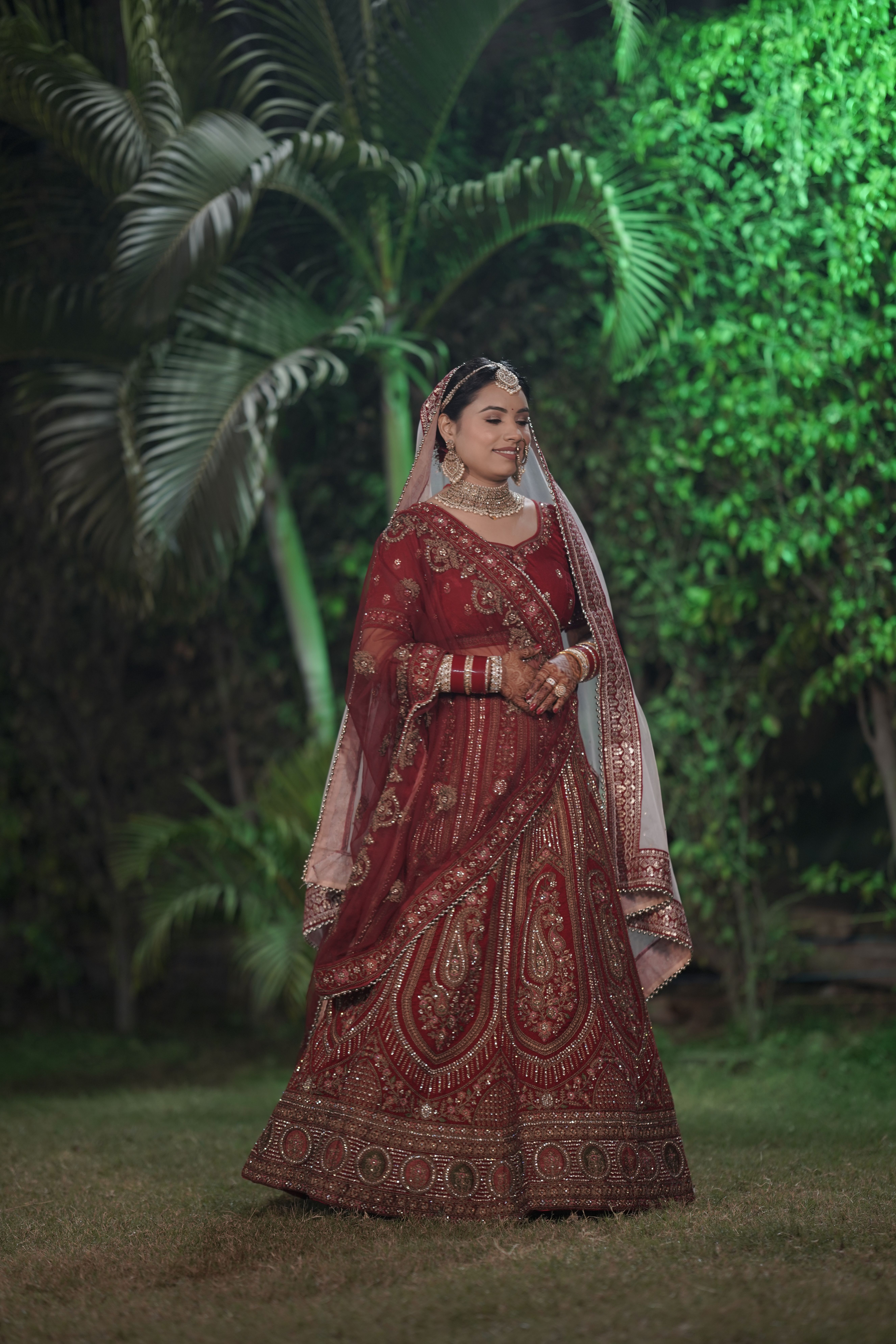 Elegant Bride in Traditional Red Bridal Attire Outdoors · Free Stock Photo