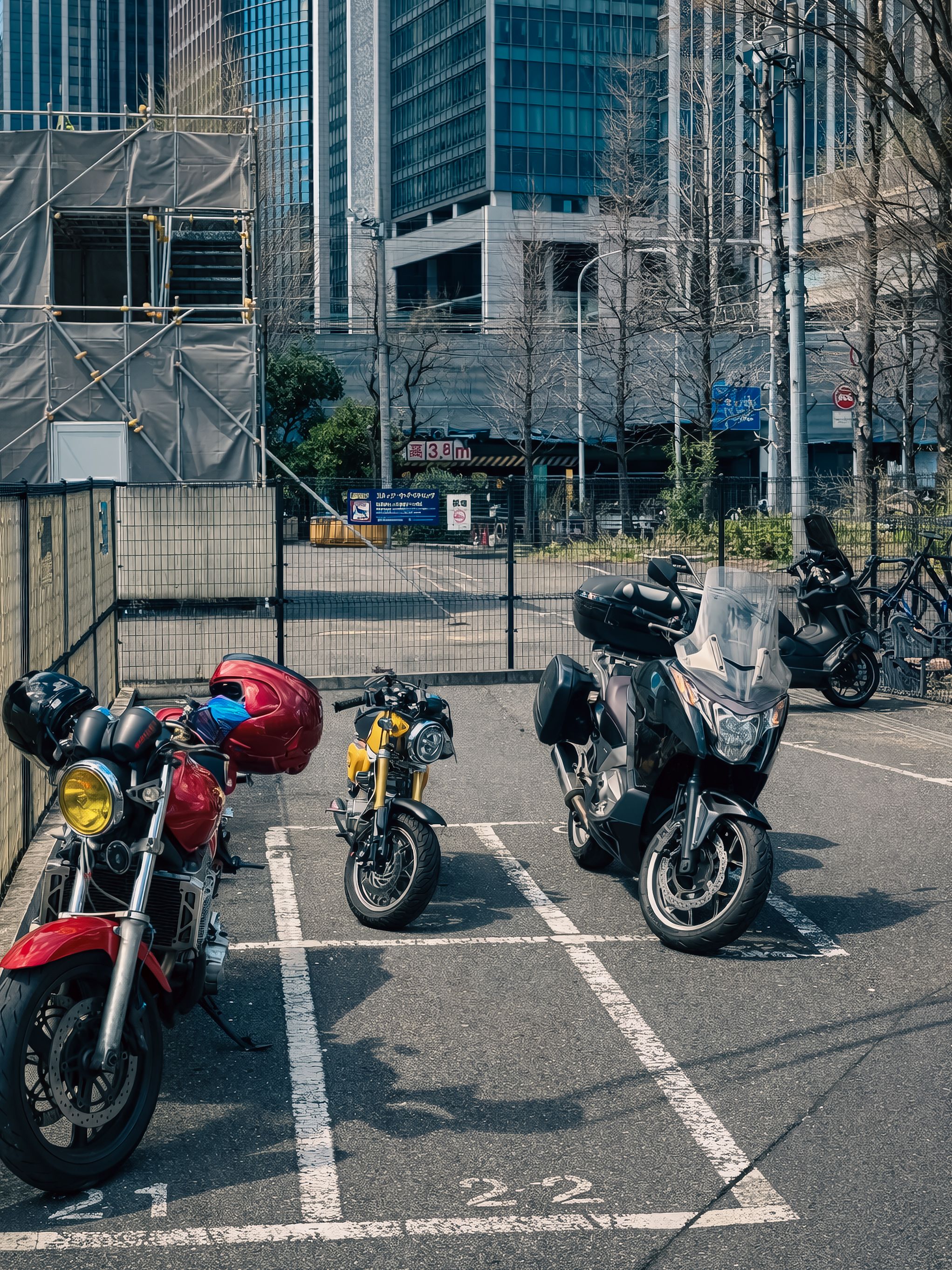 Urban Motorcycle Parking with Skyscrapers · Free Stock Photo