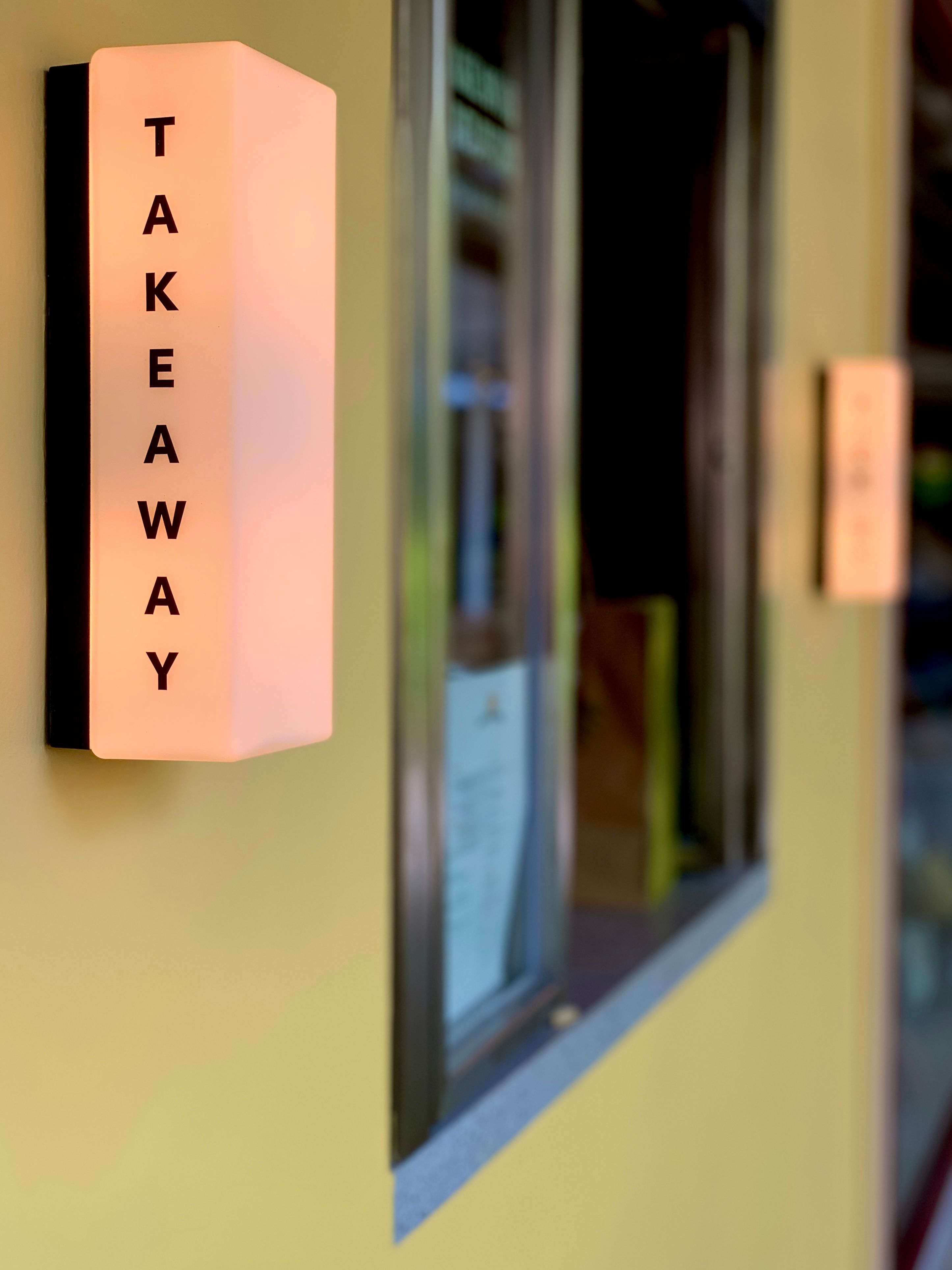 Modern Takeaway Restaurant Exterior Sign · Free Stock Photo